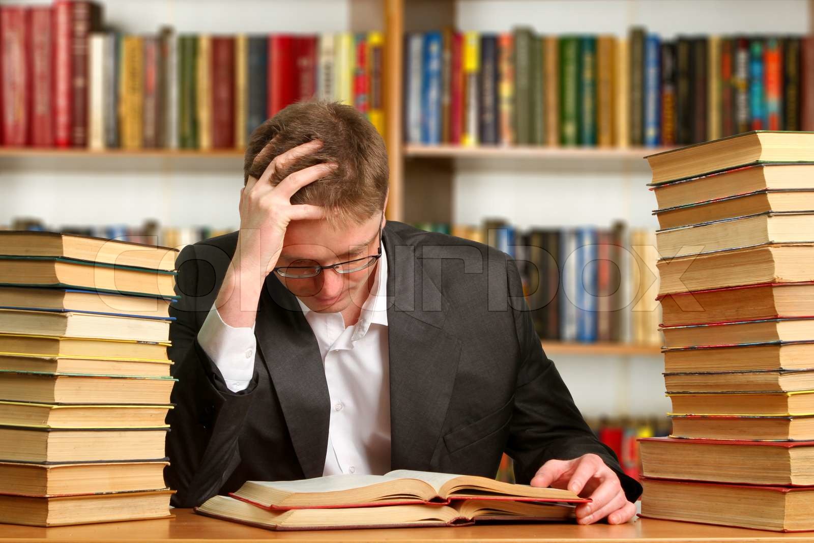 student with open book | Stock image | Colourbox