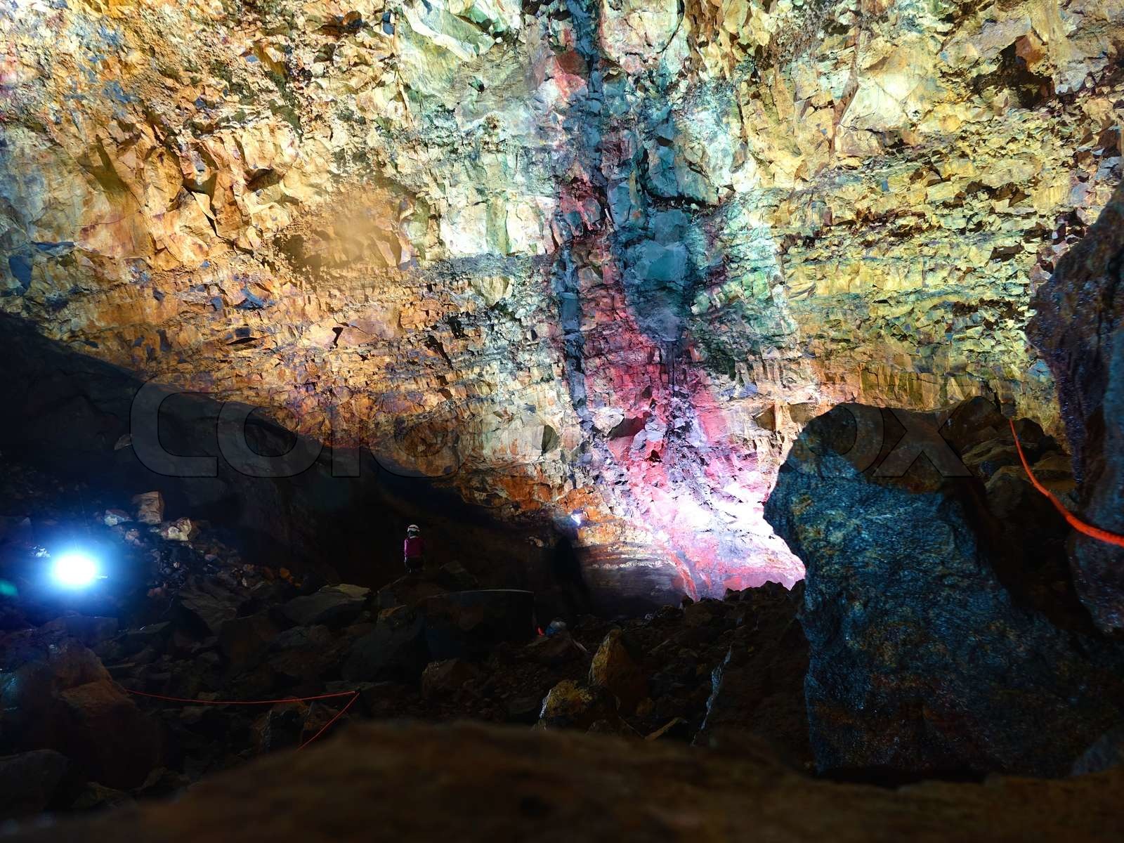 The inside of a cave lighted up by lamps | Stock image | Colourbox