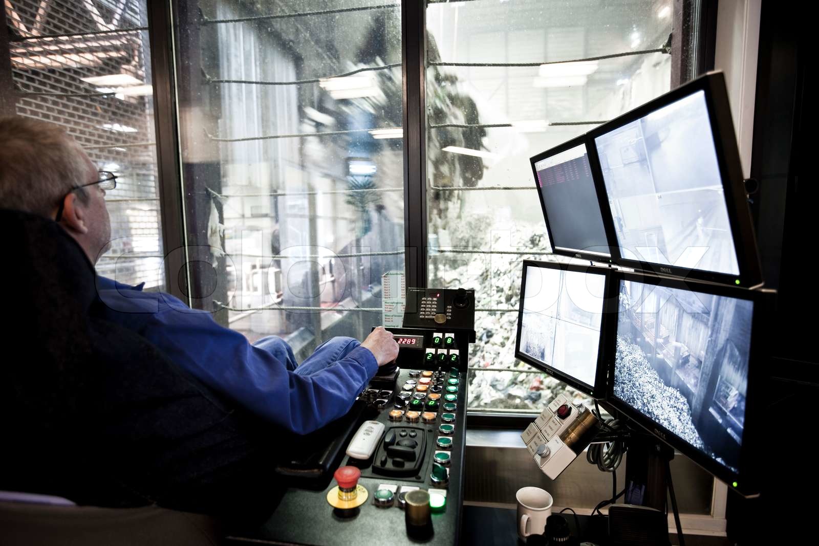 Skilled workers in a waste disposal site | Stock image | Colourbox