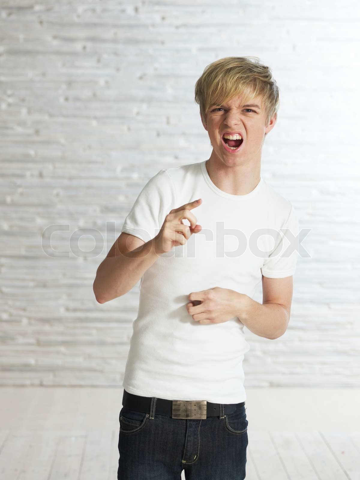 Portrait - an angry caucasian teenage boy | Stock image | Colourbox