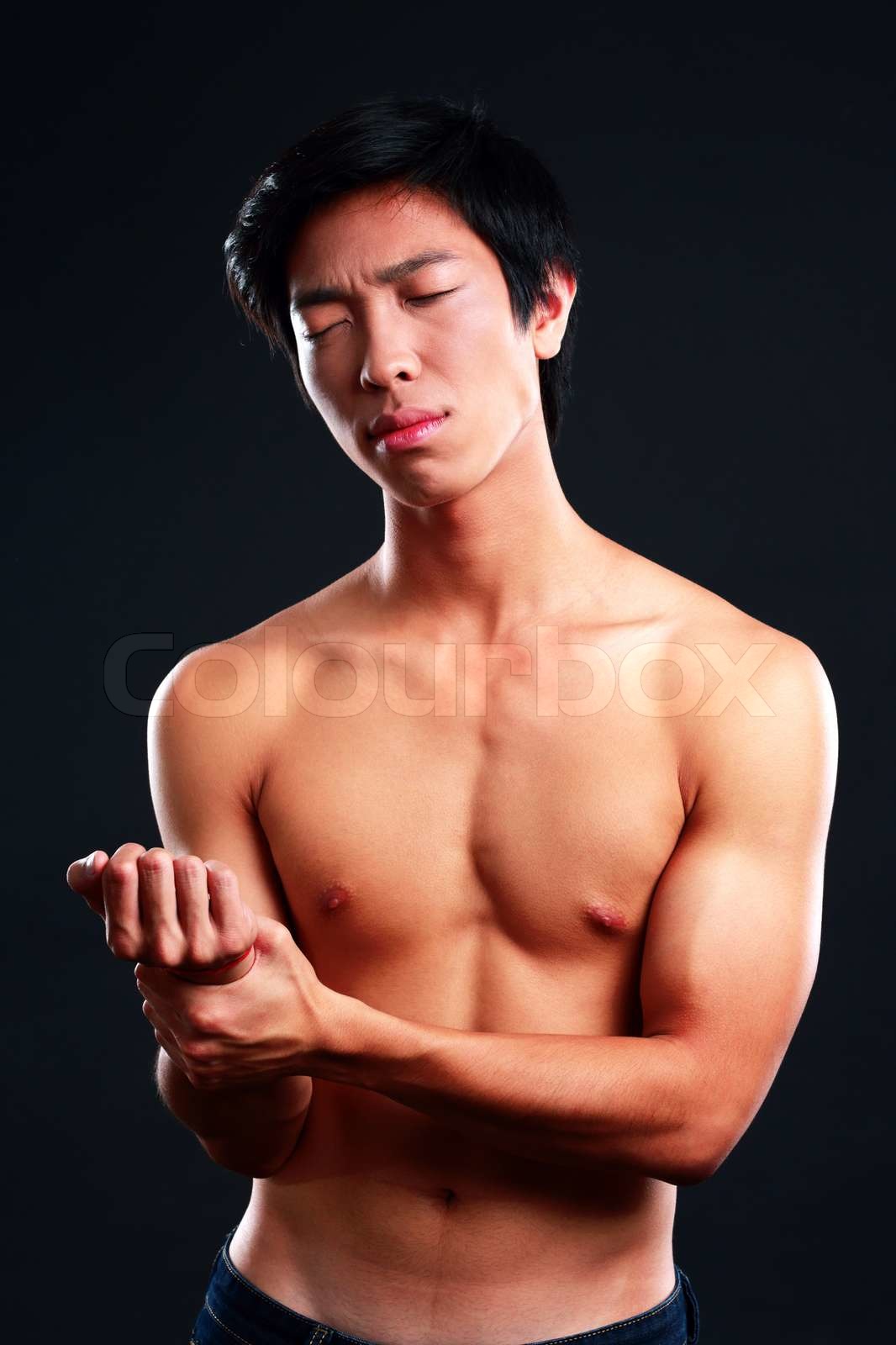 Man checking his pulse by pressing the wrist with fingers | Stock image ...
