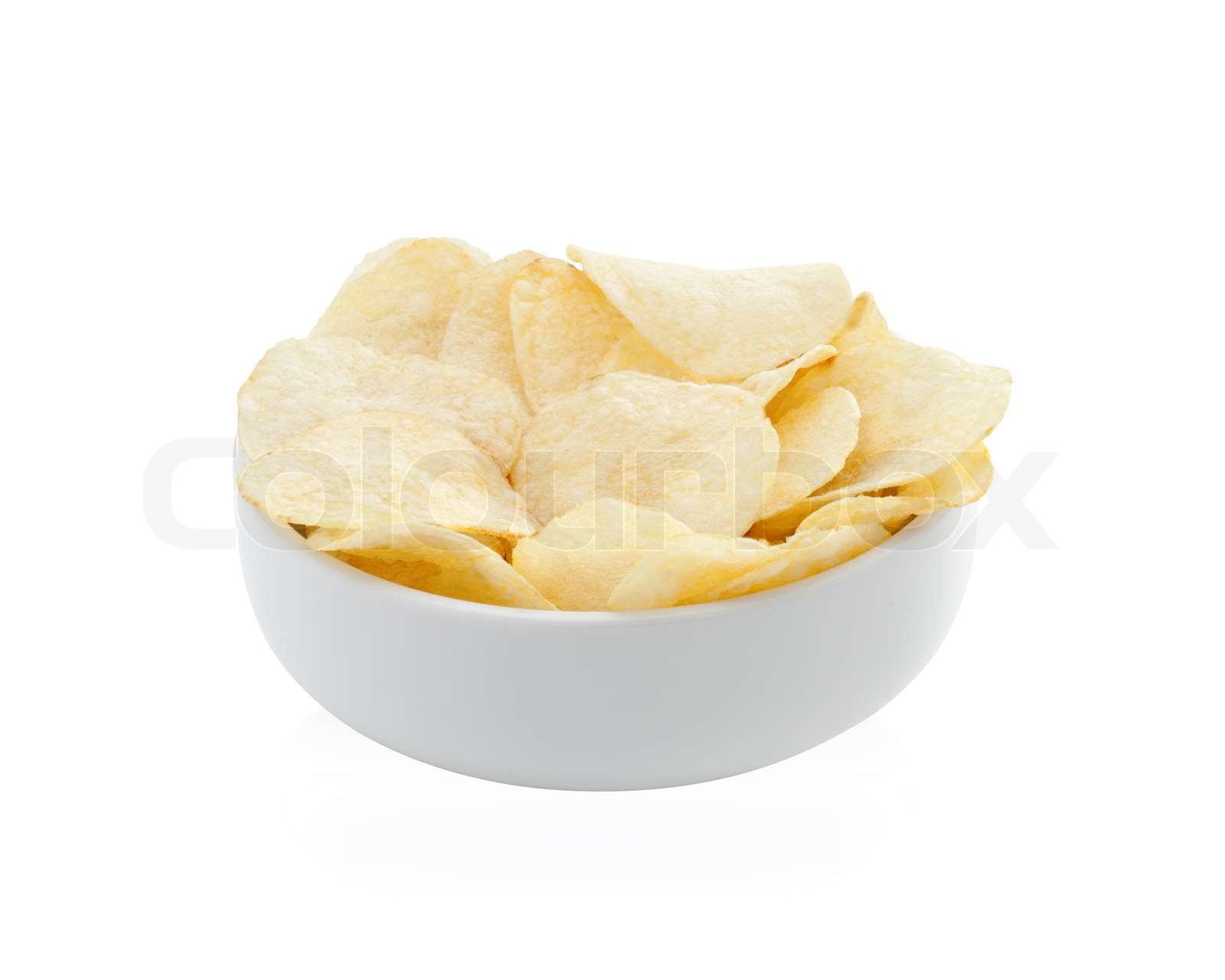 Kartoffel-Chips in eine Schüssel geben, isoliert | Stock Bild | Colourbox