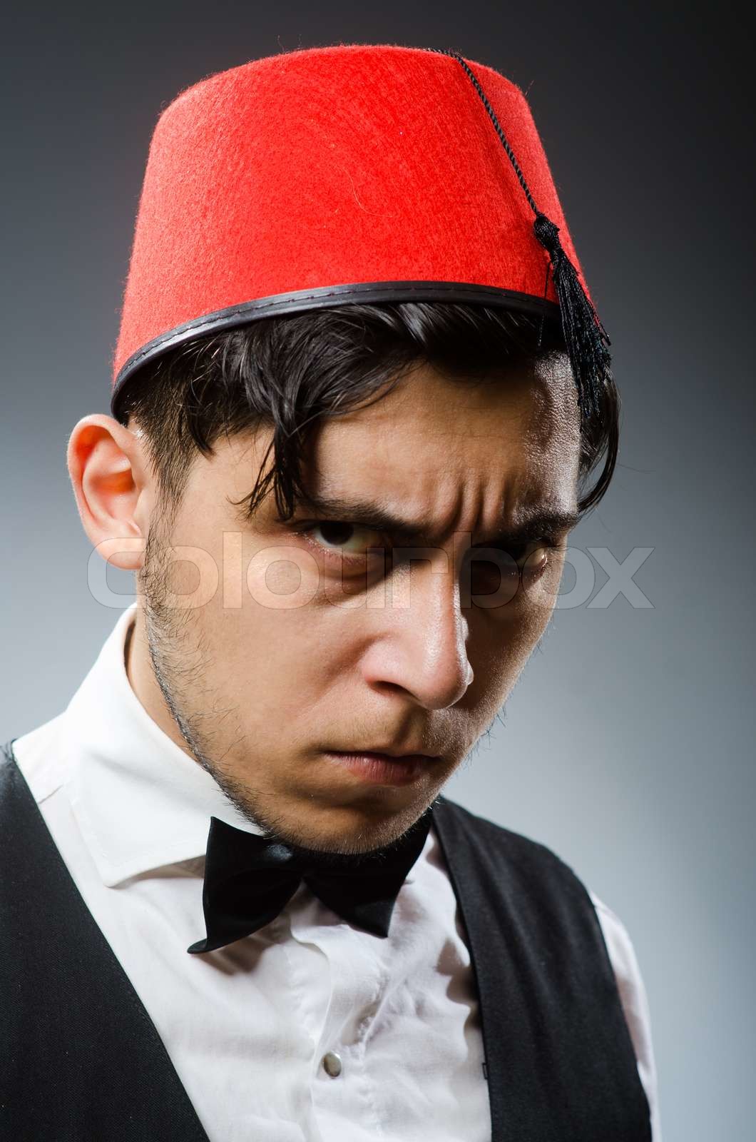 Man wearing traditional turkish hat fez | Stock image | Colourbox