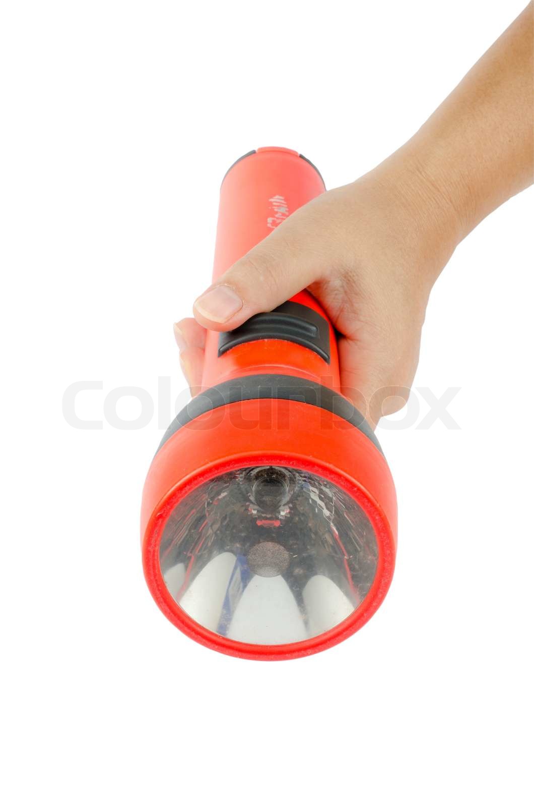Woman hand hold flashlight | Stock image | Colourbox