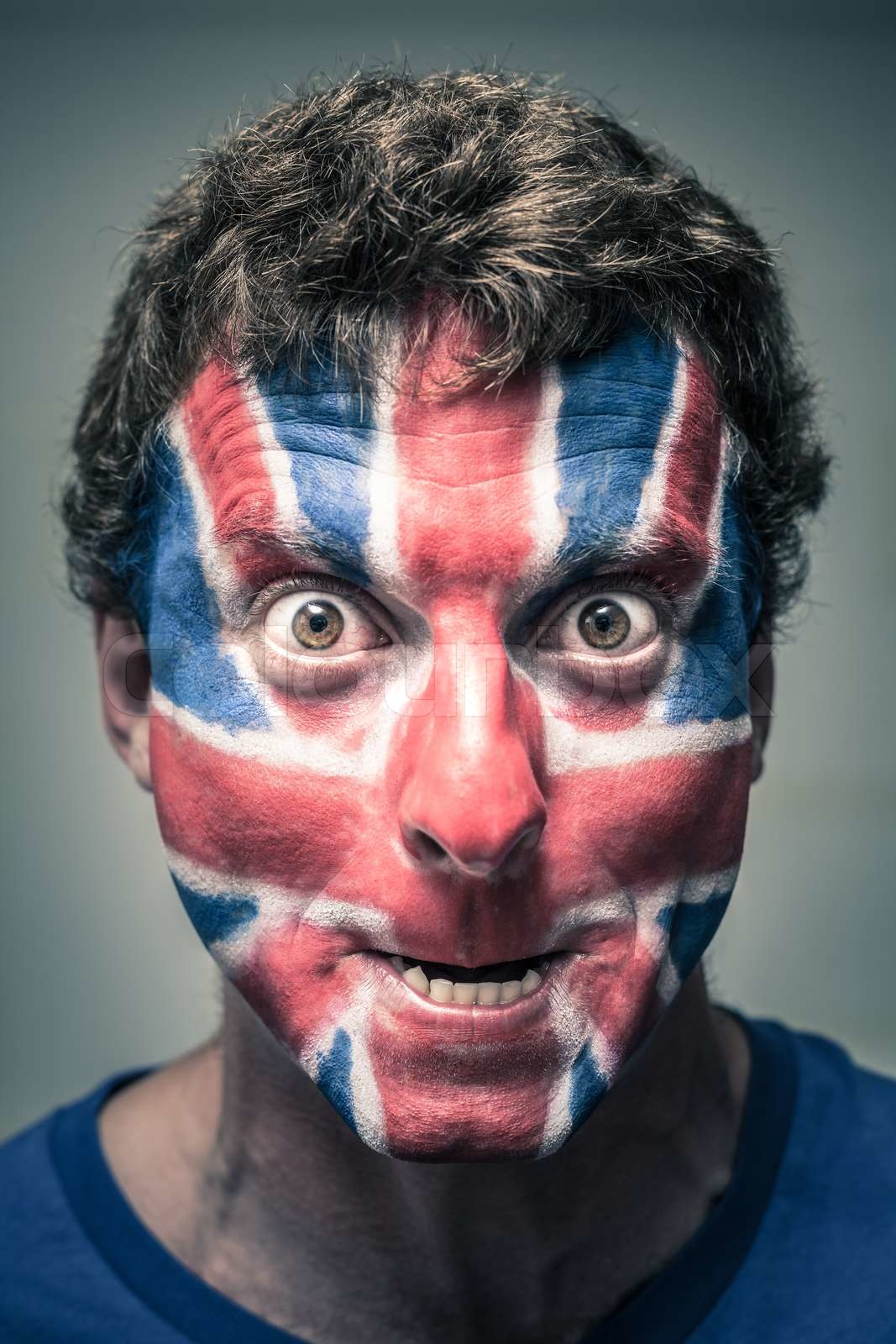 Spooky man with British flag painted on face | Stock image | Colourbox