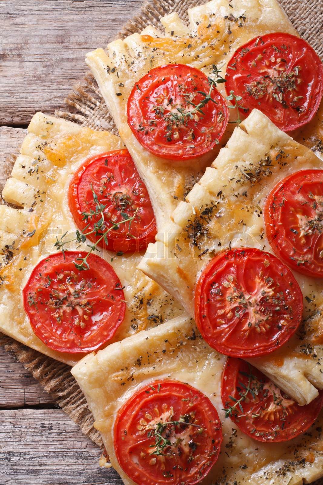 Puff pastry with tomato and cheese vertical. top view | Stock image ...