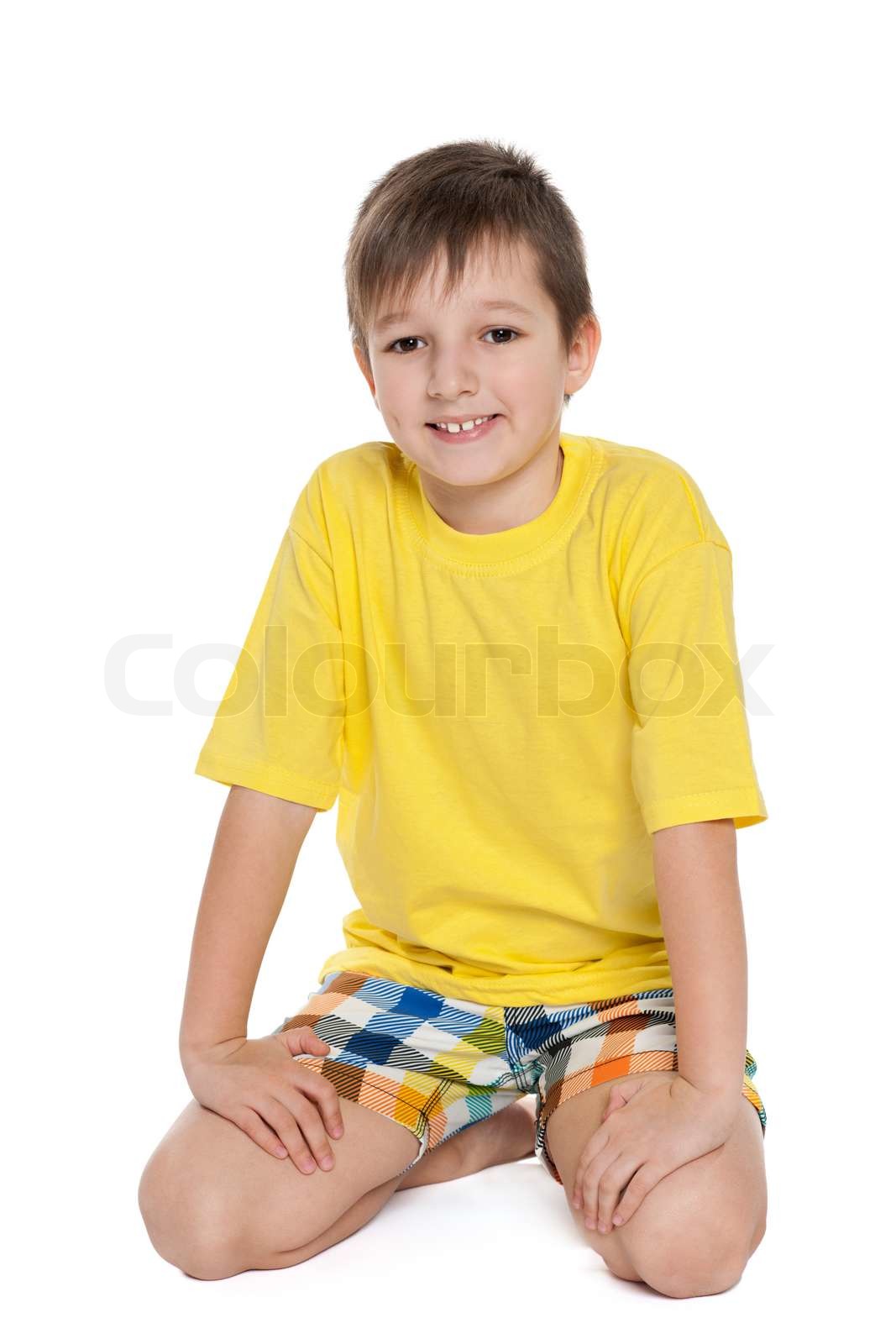 Happy little boy in the yellow shirt | Stock image | Colourbox