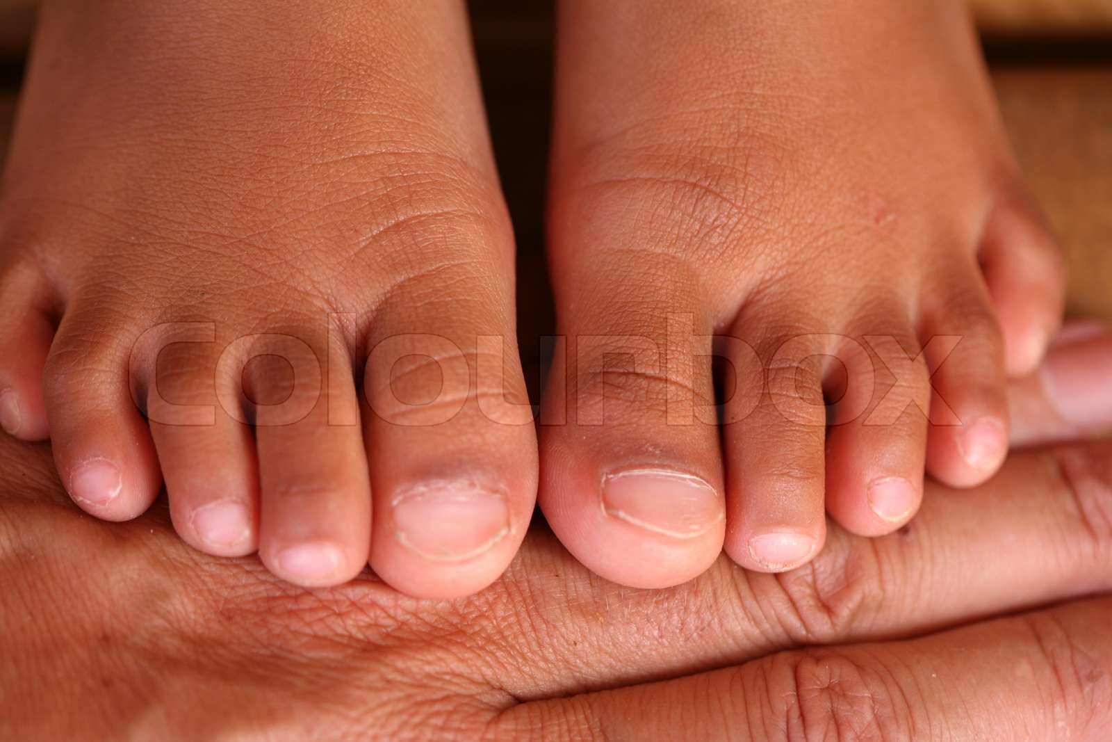 child feet | Stock image | Colourbox