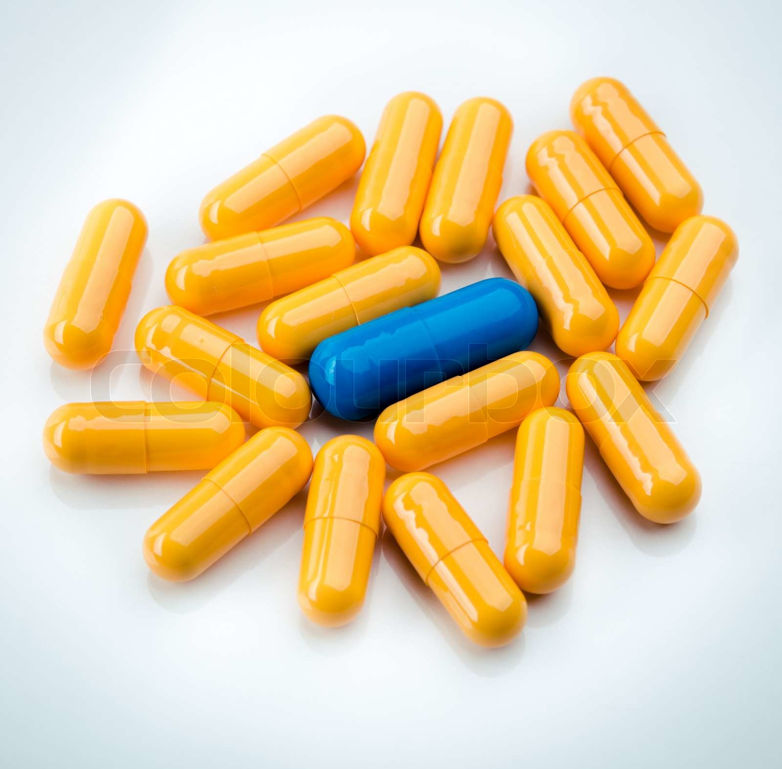 one blue and yellow capsules | Stock image | Colourbox
