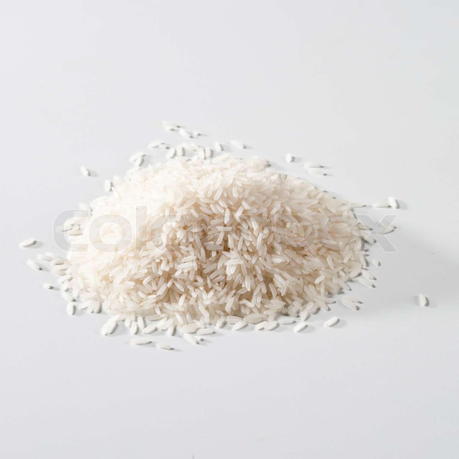 Nærbillede af ris på en hvid baggrund | Stock foto | Colourbox