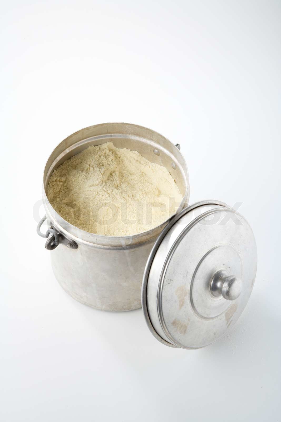 Flour in a metal container | Stock image | Colourbox