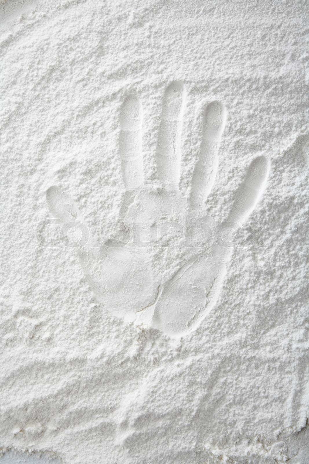 Flour with handprint | Stock image | Colourbox