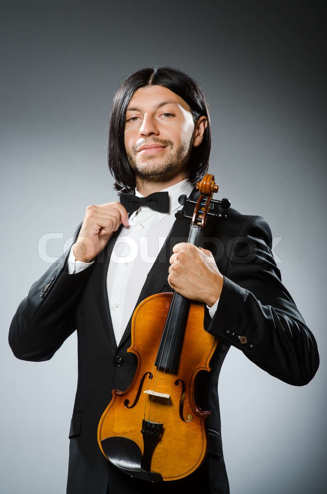 Man violin player in musican concept | Stock image | Colourbox