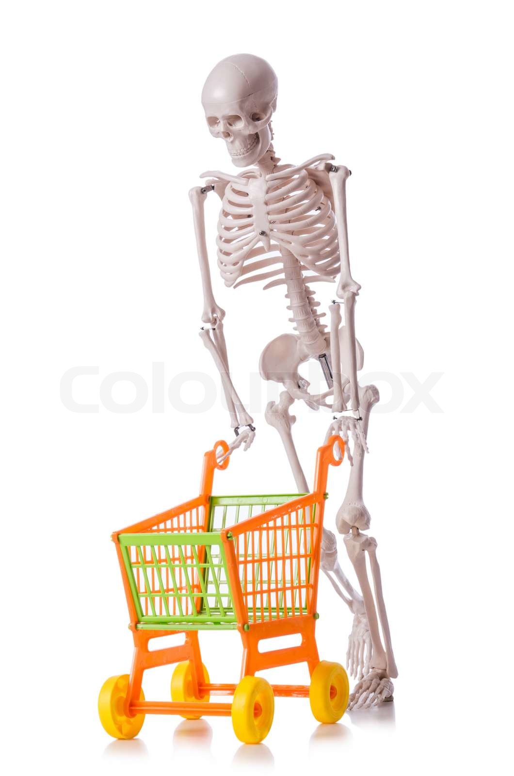 Skeleton with shopping cart trolley isolated on white | Stock image ...