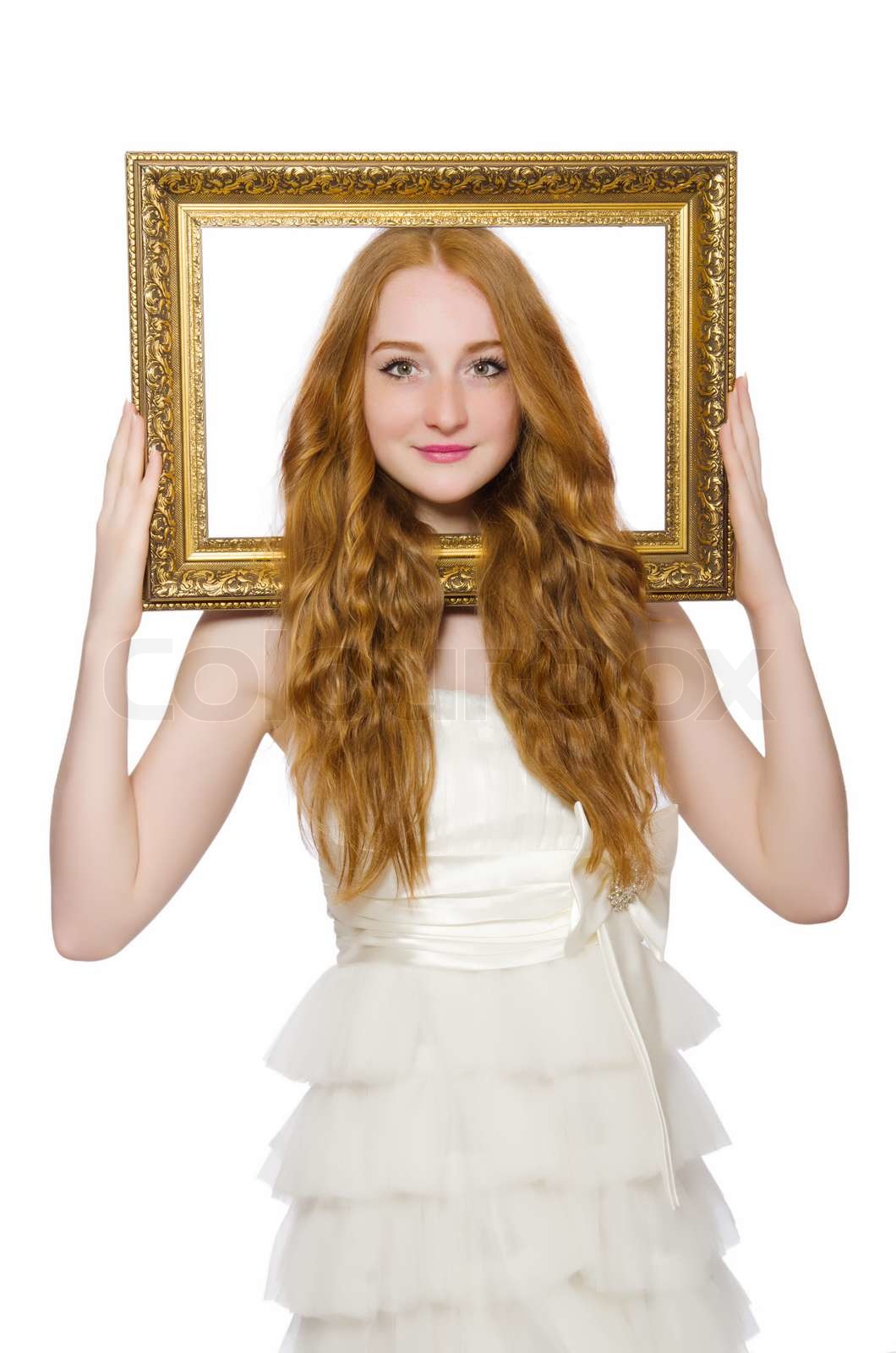 Woman holding picture frame isolated on white | Stock image | Colourbox