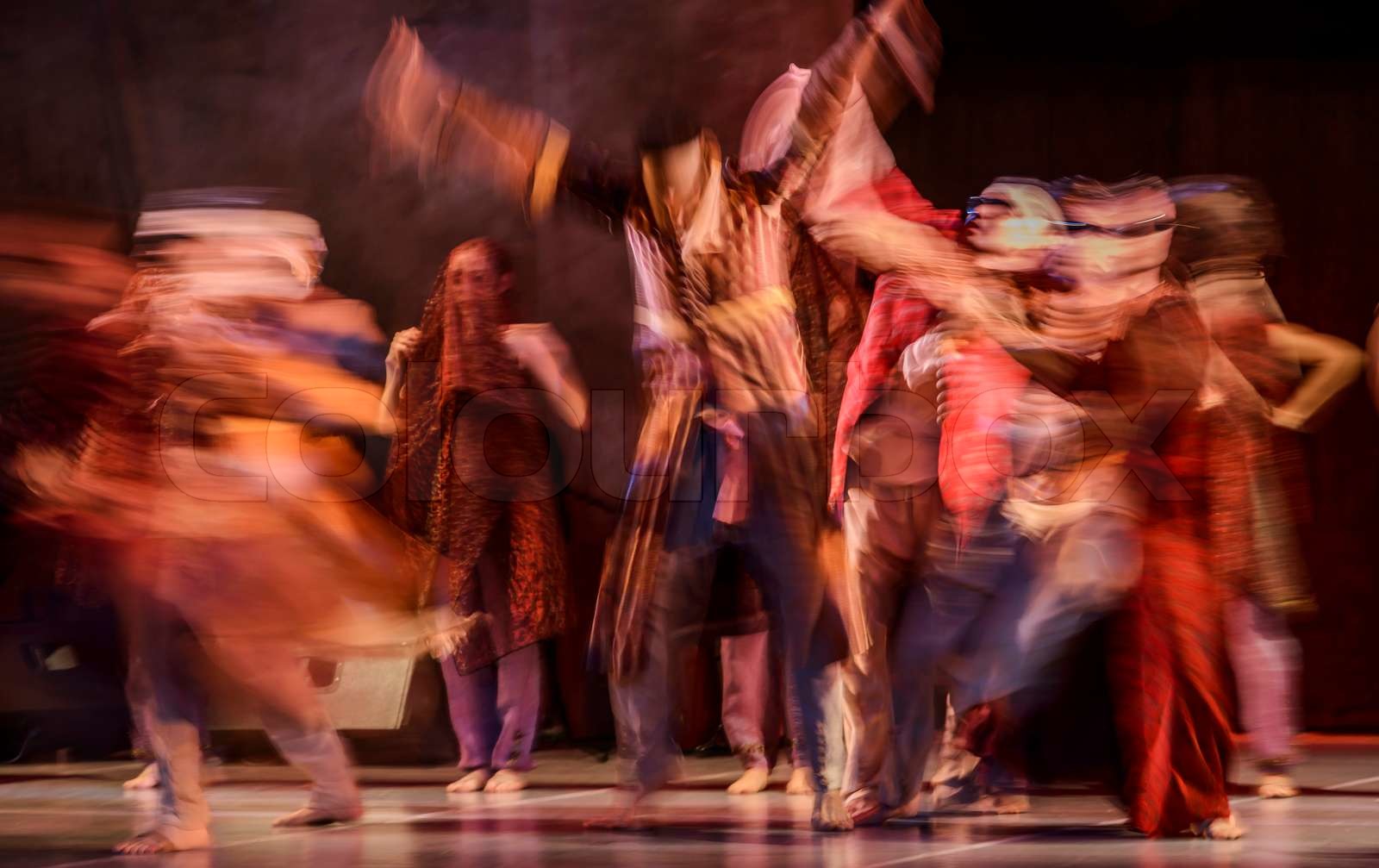 Group of contemporary dancers performing on stage | Stock image | Colourbox