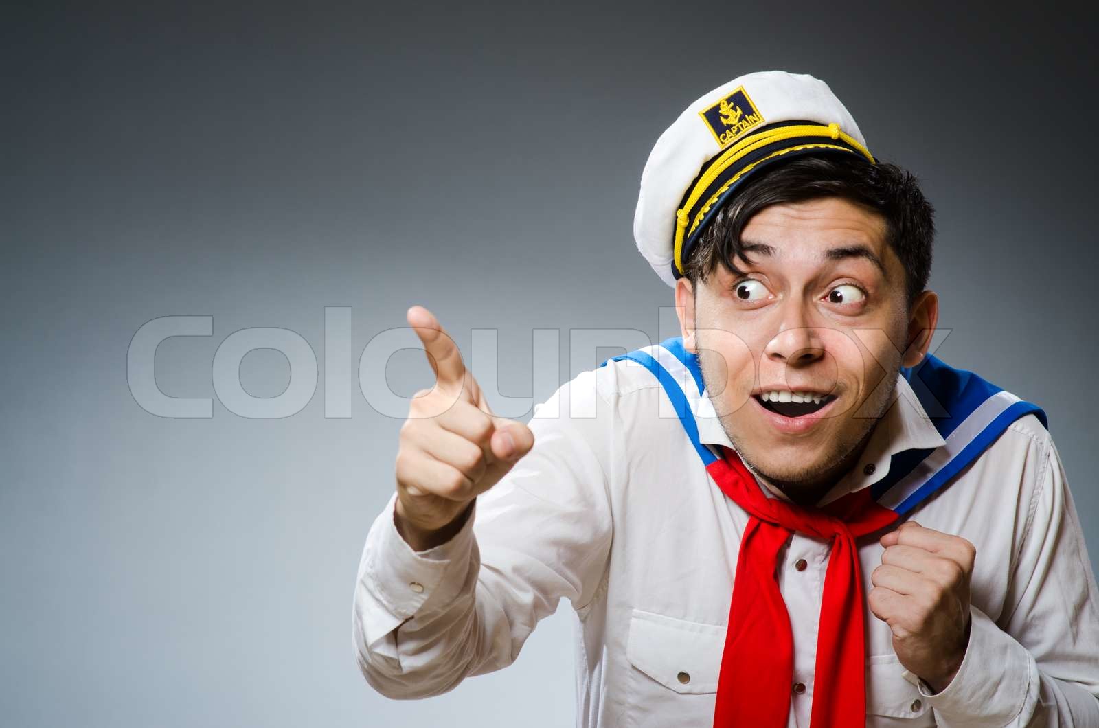 Funny captain sailor wearing hat | Stock image | Colourbox