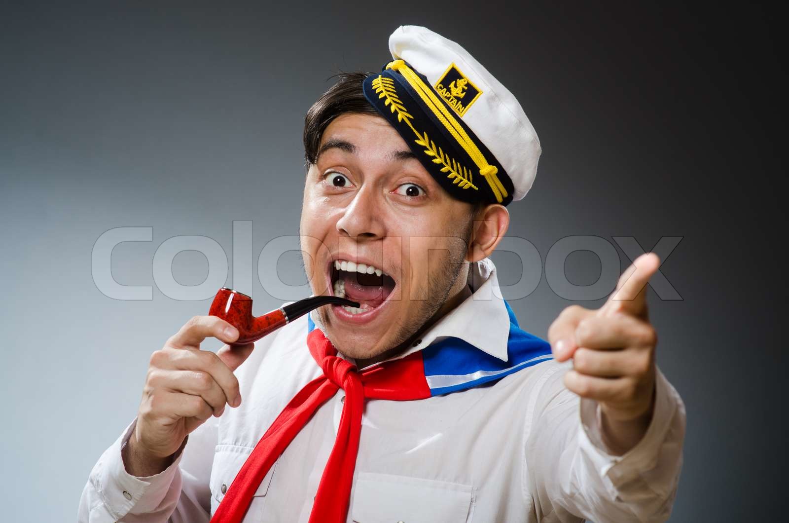 Funny captain sailor wearing hat | Stock image | Colourbox