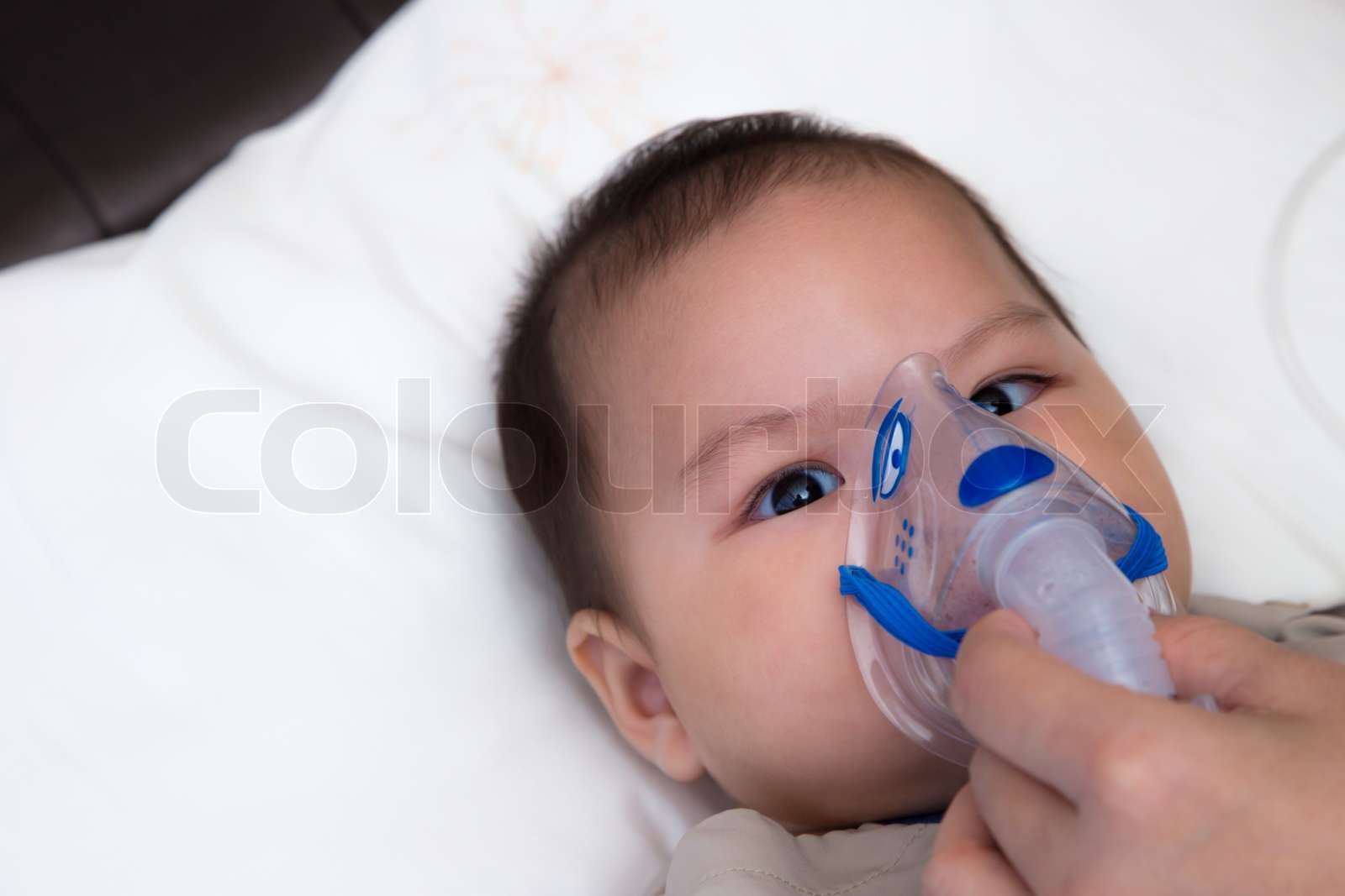 Baby using spacer | Stock image | Colourbox