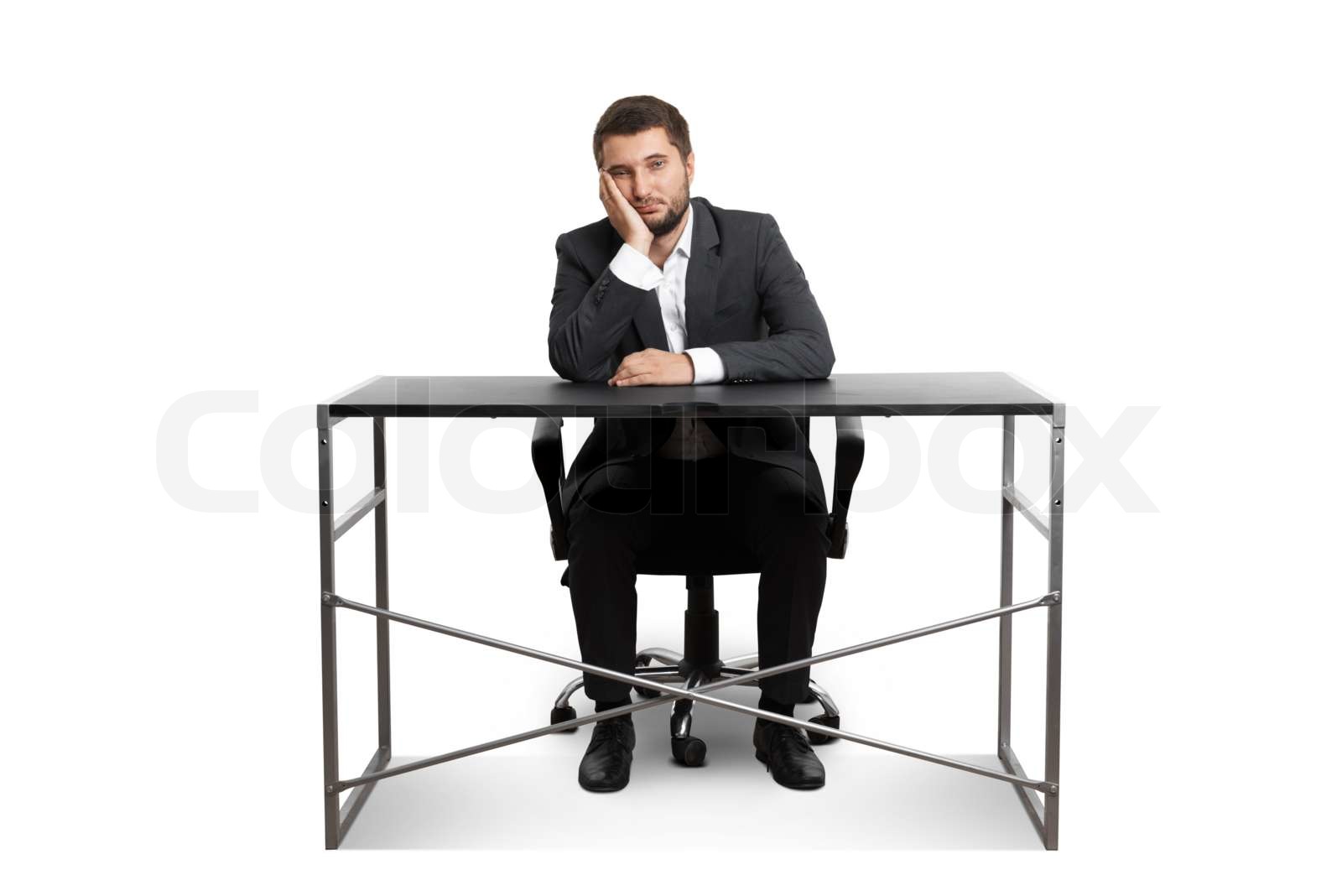 wearied businessman sitting | Stock image | Colourbox