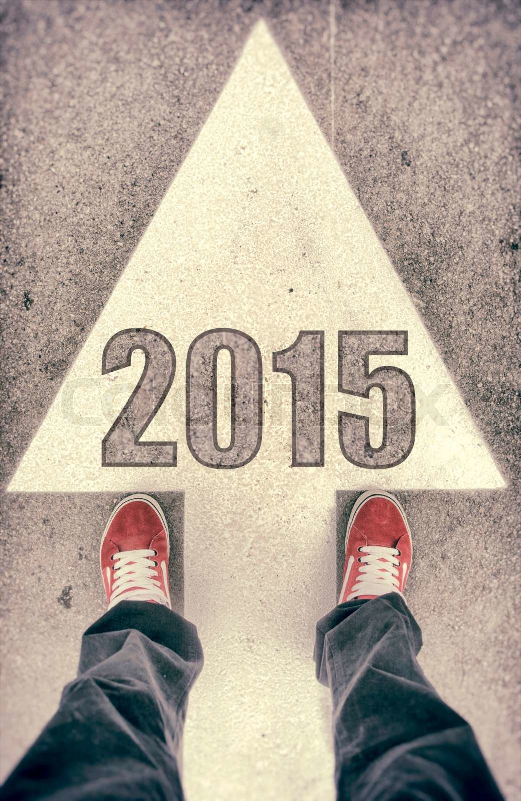 Shoes and forward arrow sign from above | Stock image | Colourbox