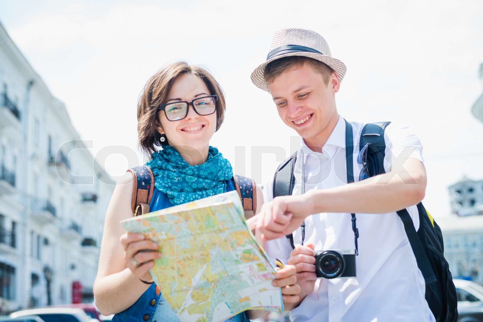 tourists with map | Stock image | Colourbox