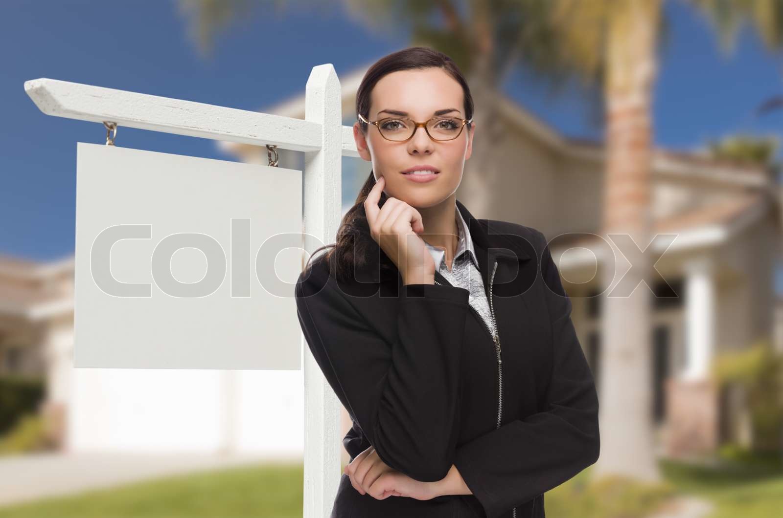 Woman In Front Of House and Blank Real Estate Sign | Stock image ...