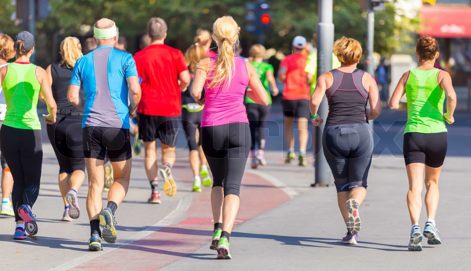 Group of people running. | Stock image | Colourbox