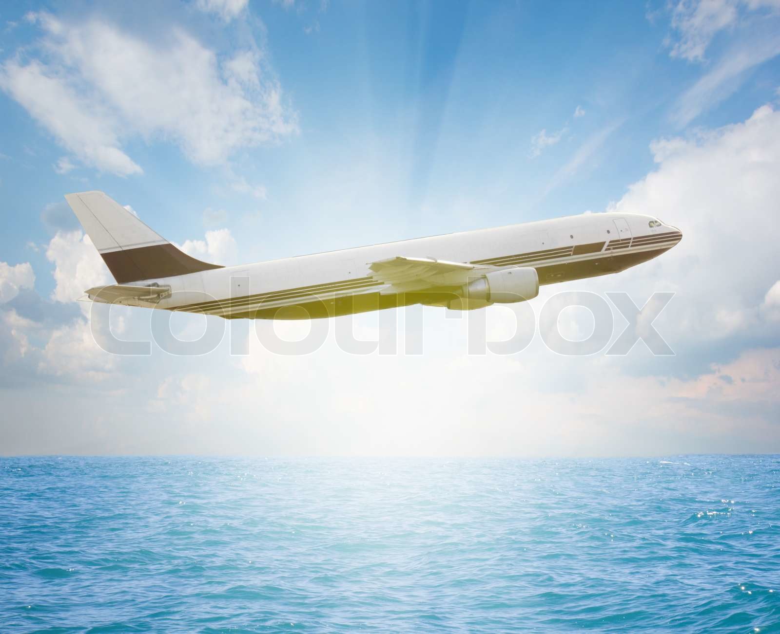 plane over ocean | Stock image | Colourbox
