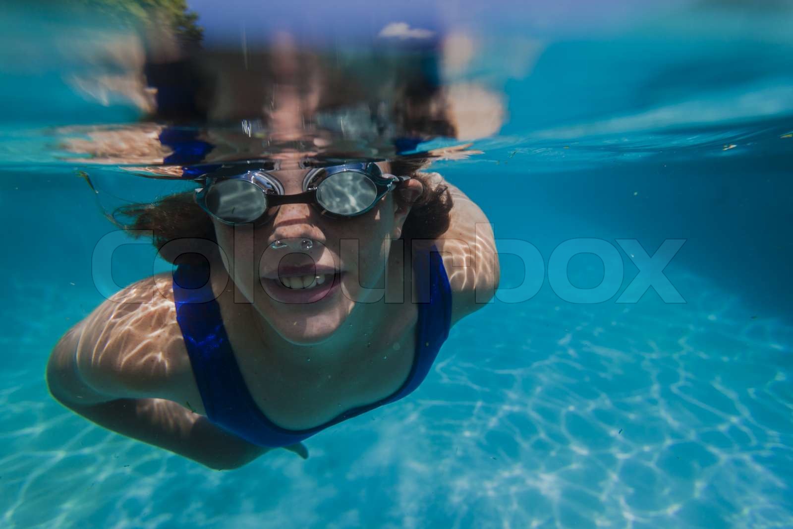 Girl Swimming Pool | Stock image | Colourbox
