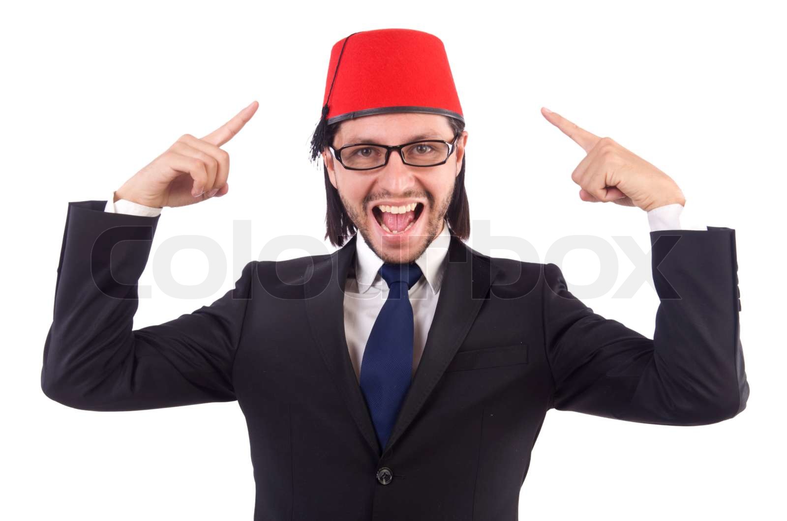 Businessman wearing fez hat isolated on white | Stock image | Colourbox