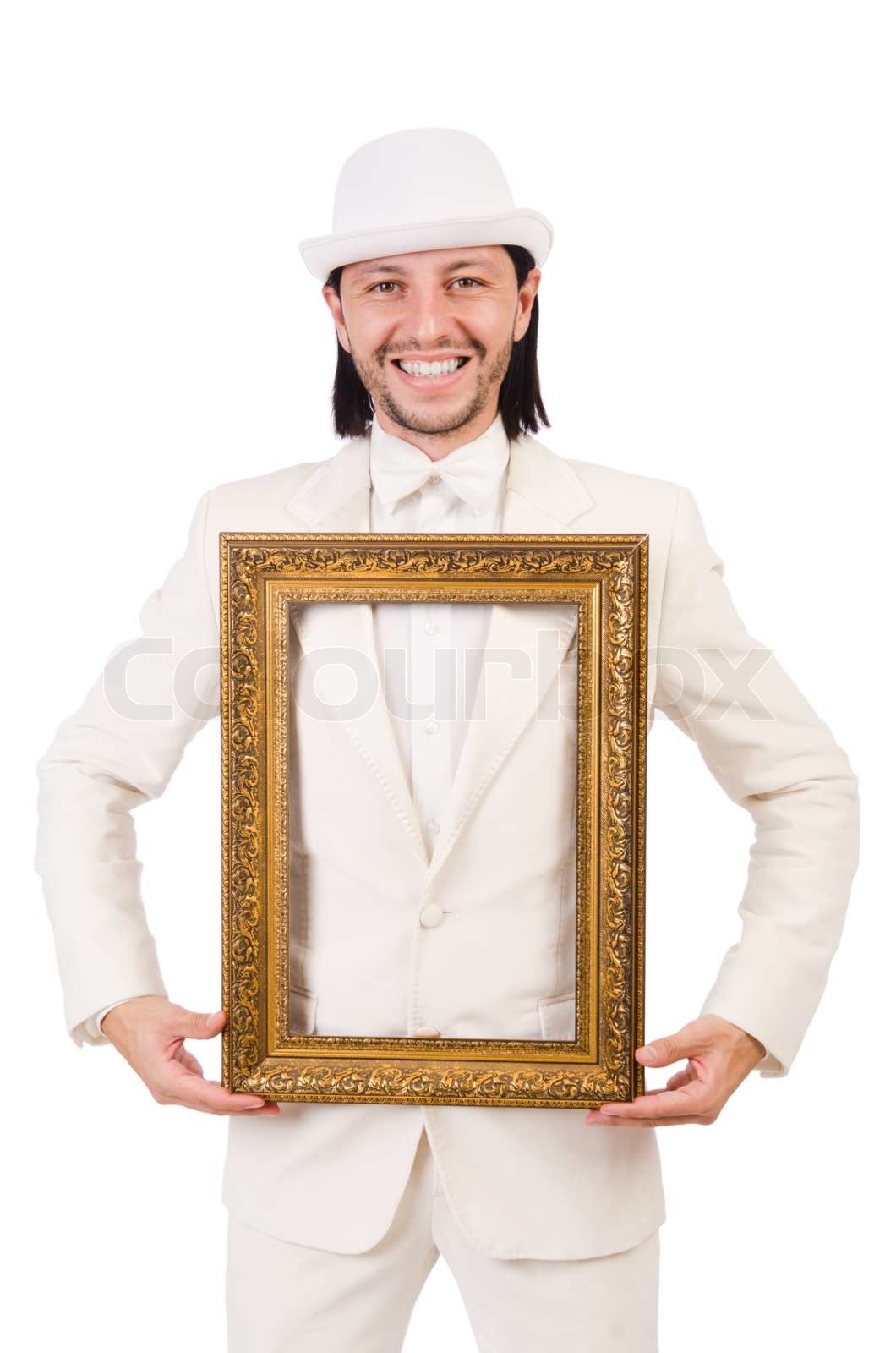 Man in white costume with picture frame | Stock image | Colourbox