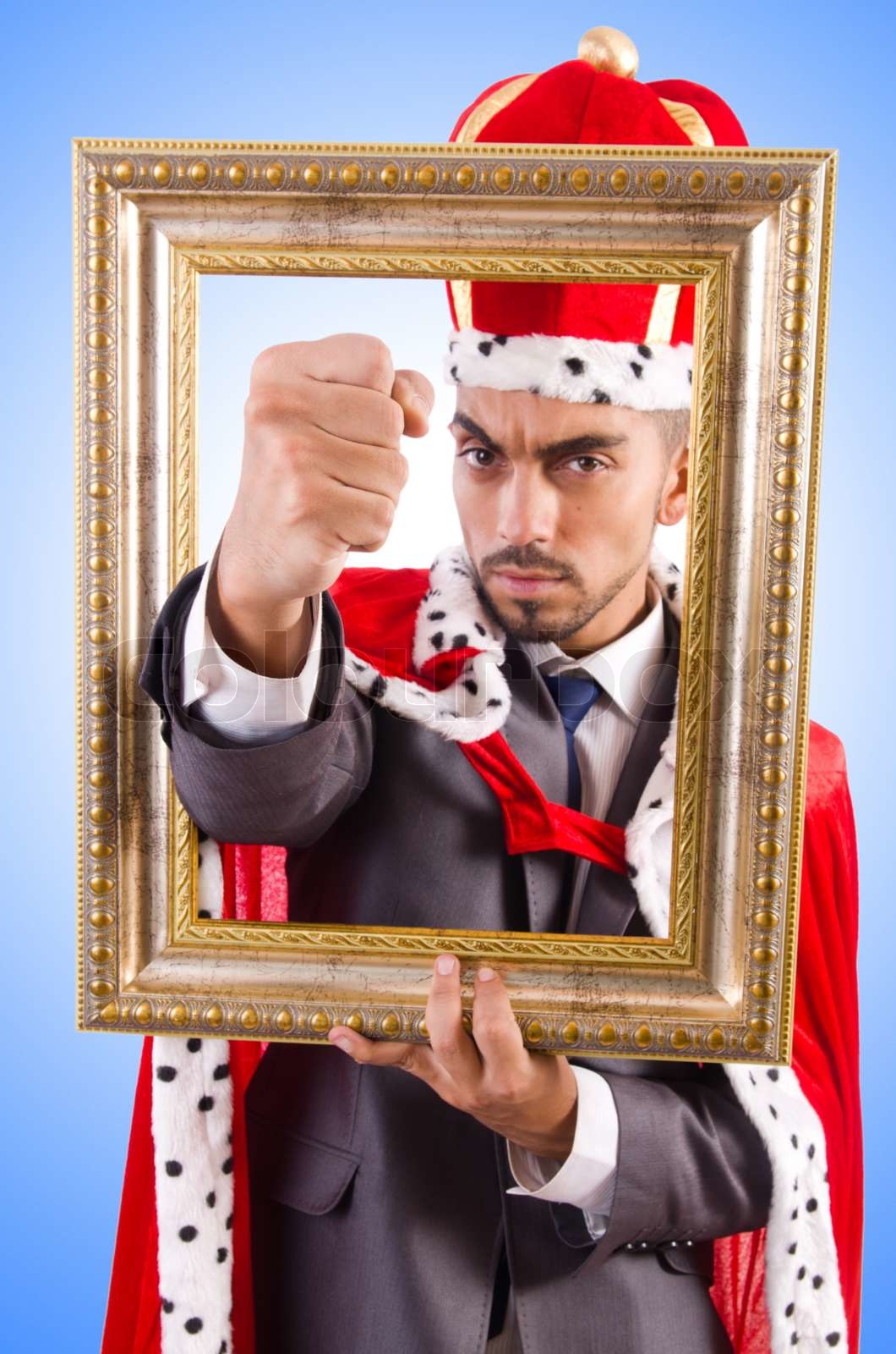 King with picture frame on white | Stock image | Colourbox