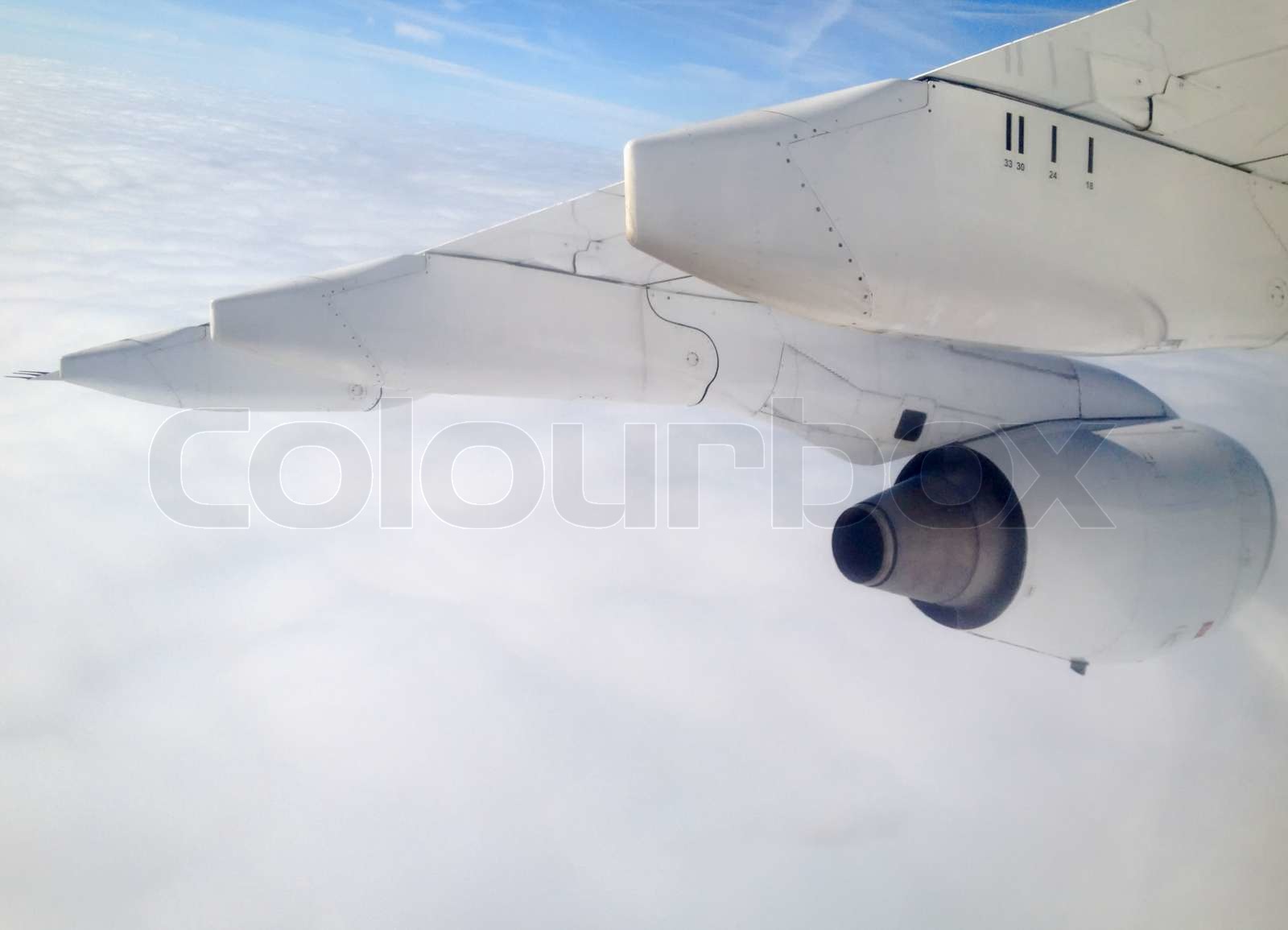 Airplane in flight with Jet Engine detail | Stock image | Colourbox