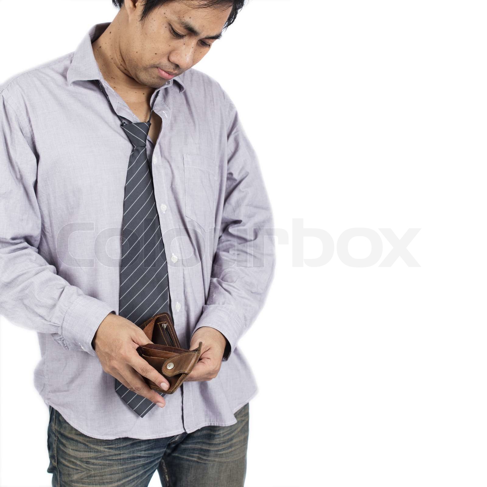 Man and empty pocket | Stock image | Colourbox
