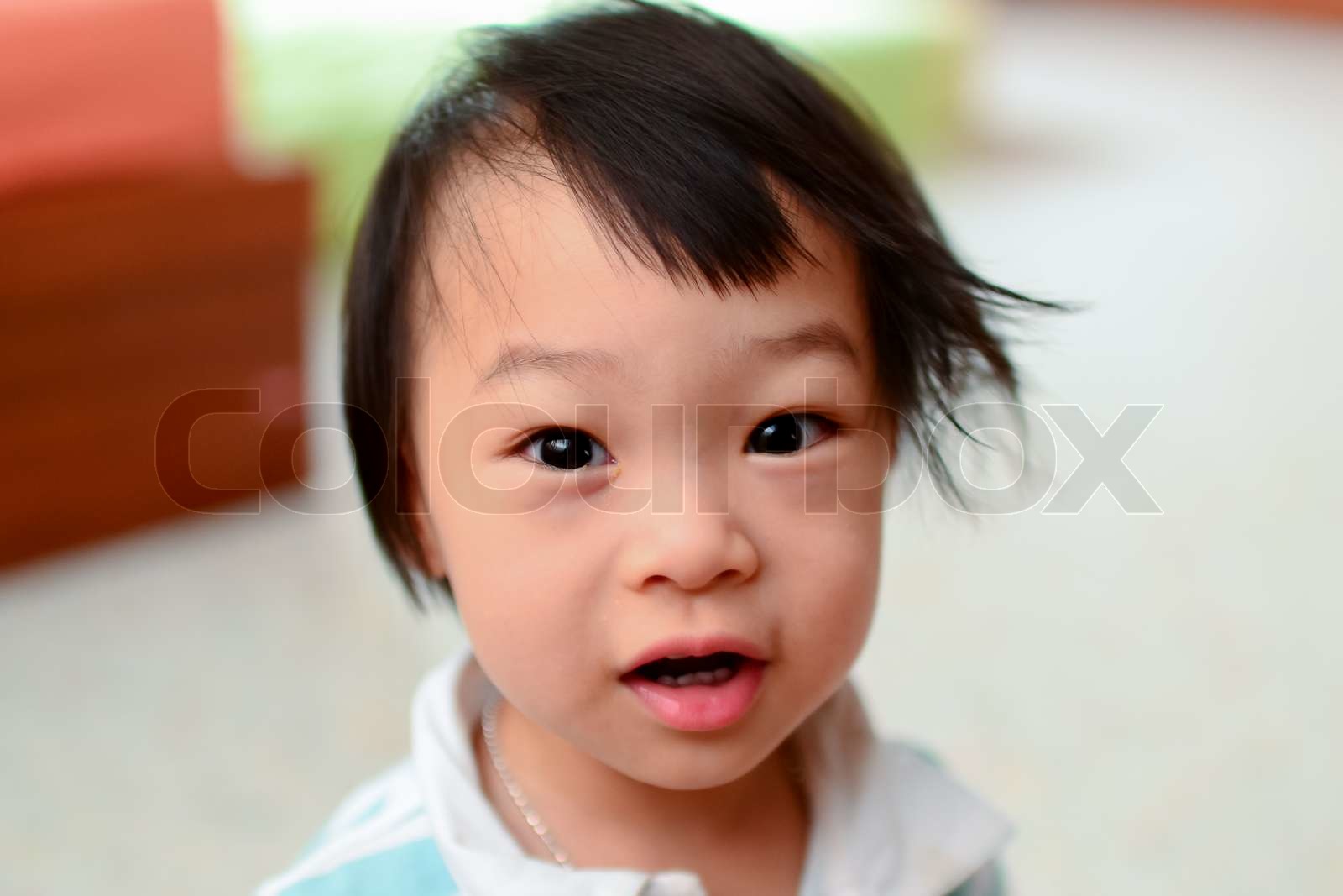 Cute Asian girl, headshot. | Stock image | Colourbox