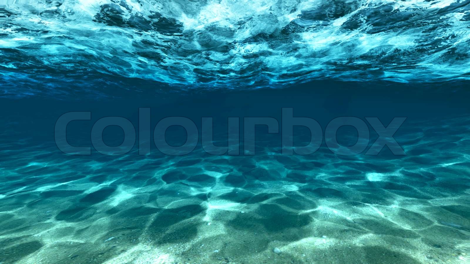 Surface of sand under water | Stock image | Colourbox