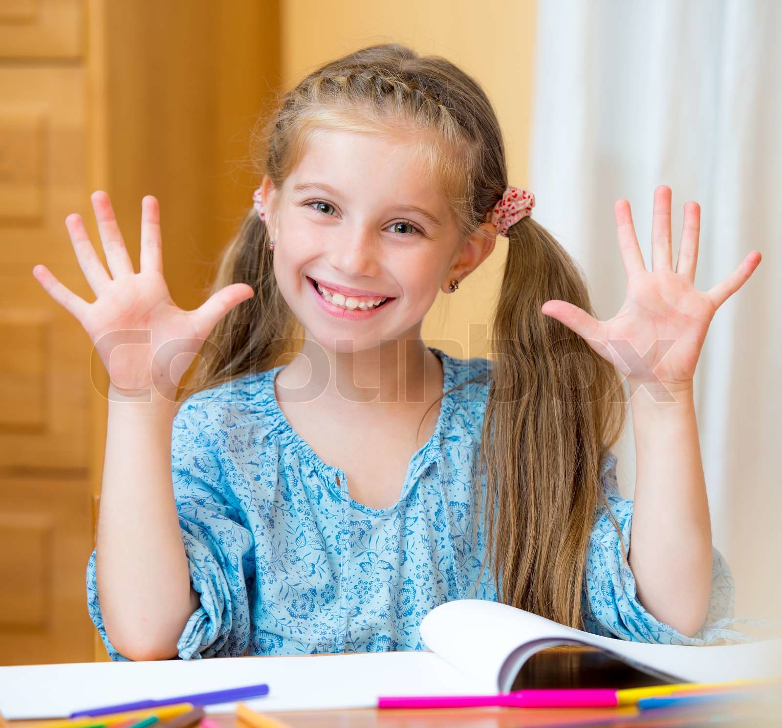 Schoolgirl Studying In Classroom | Stock image | Colourbox