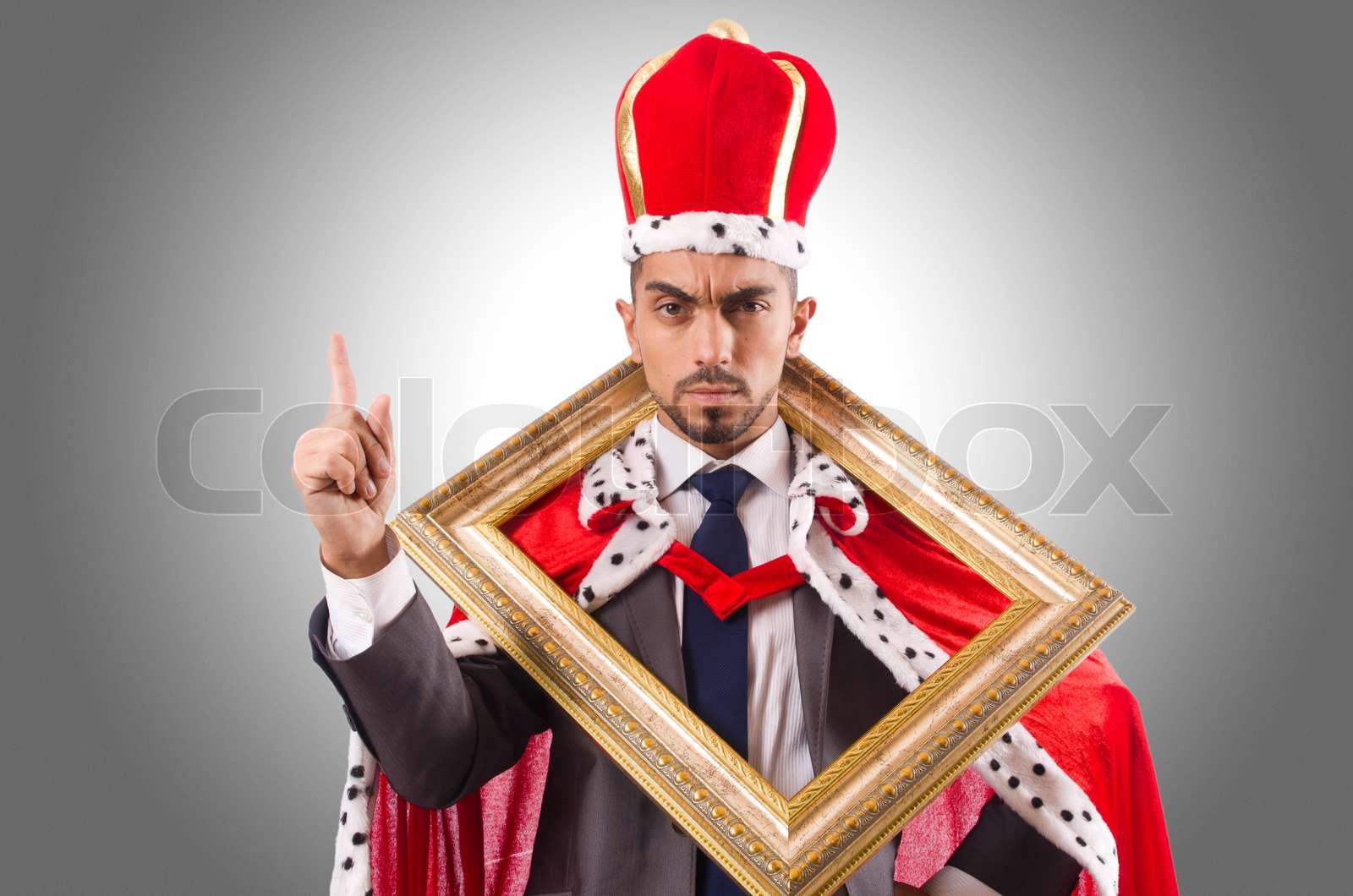 King with picture frame on white | Stock image | Colourbox
