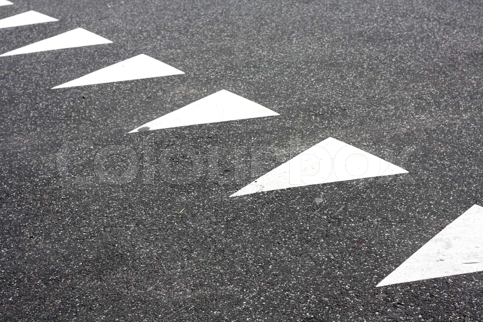 Shark teeth sign on the road | Stock image | Colourbox