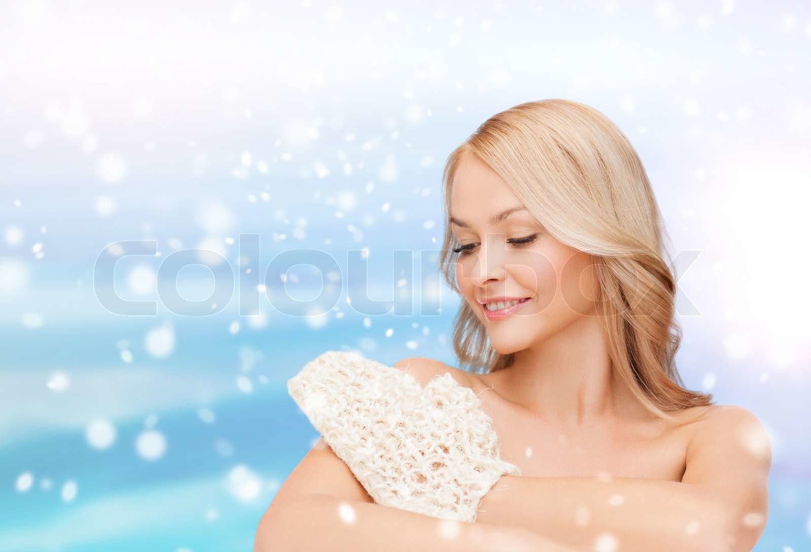 beautiful woman washing herself with wisp | Stock image | Colourbox