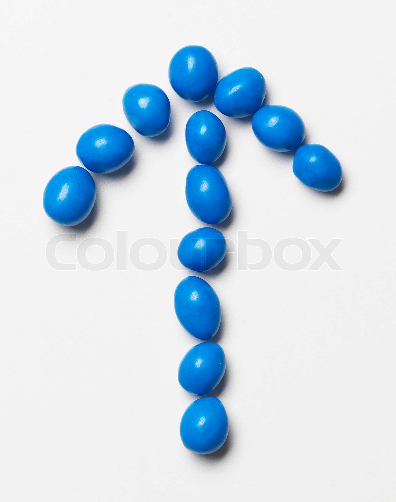 Blåt slik formet som en pil, der peger opad | Stock foto | Colourbox