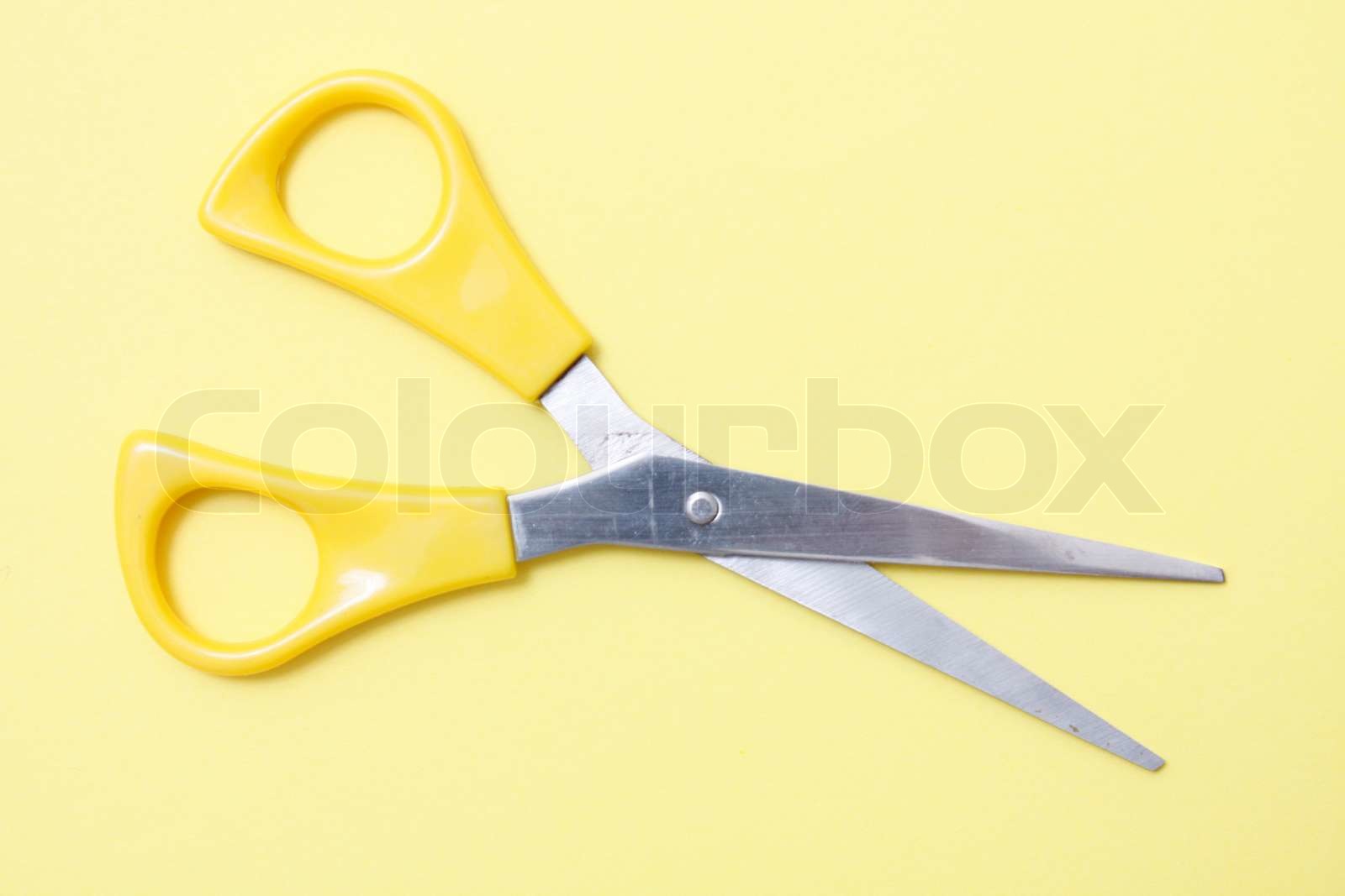 Yellow scissors | Stock image | Colourbox