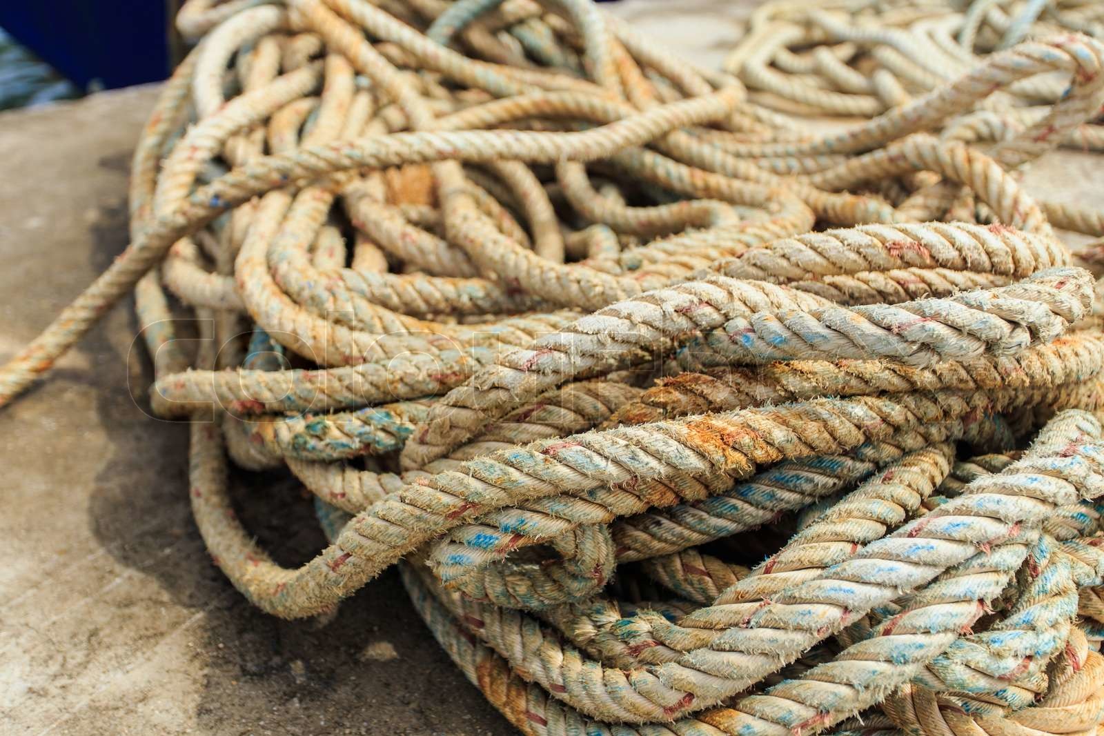 Stack of rope at the pier | Stock image | Colourbox