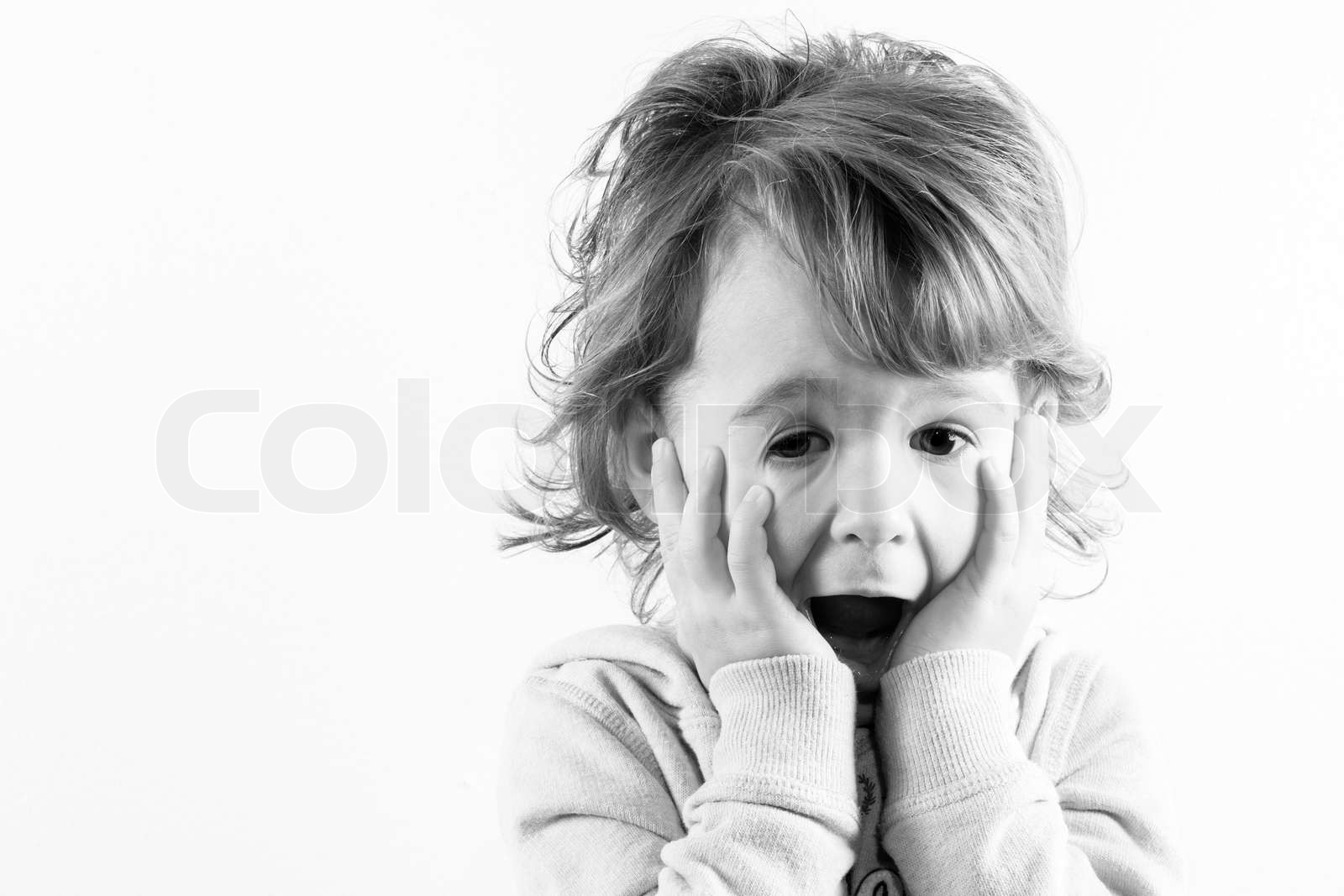 Shocked child face | Stock image | Colourbox