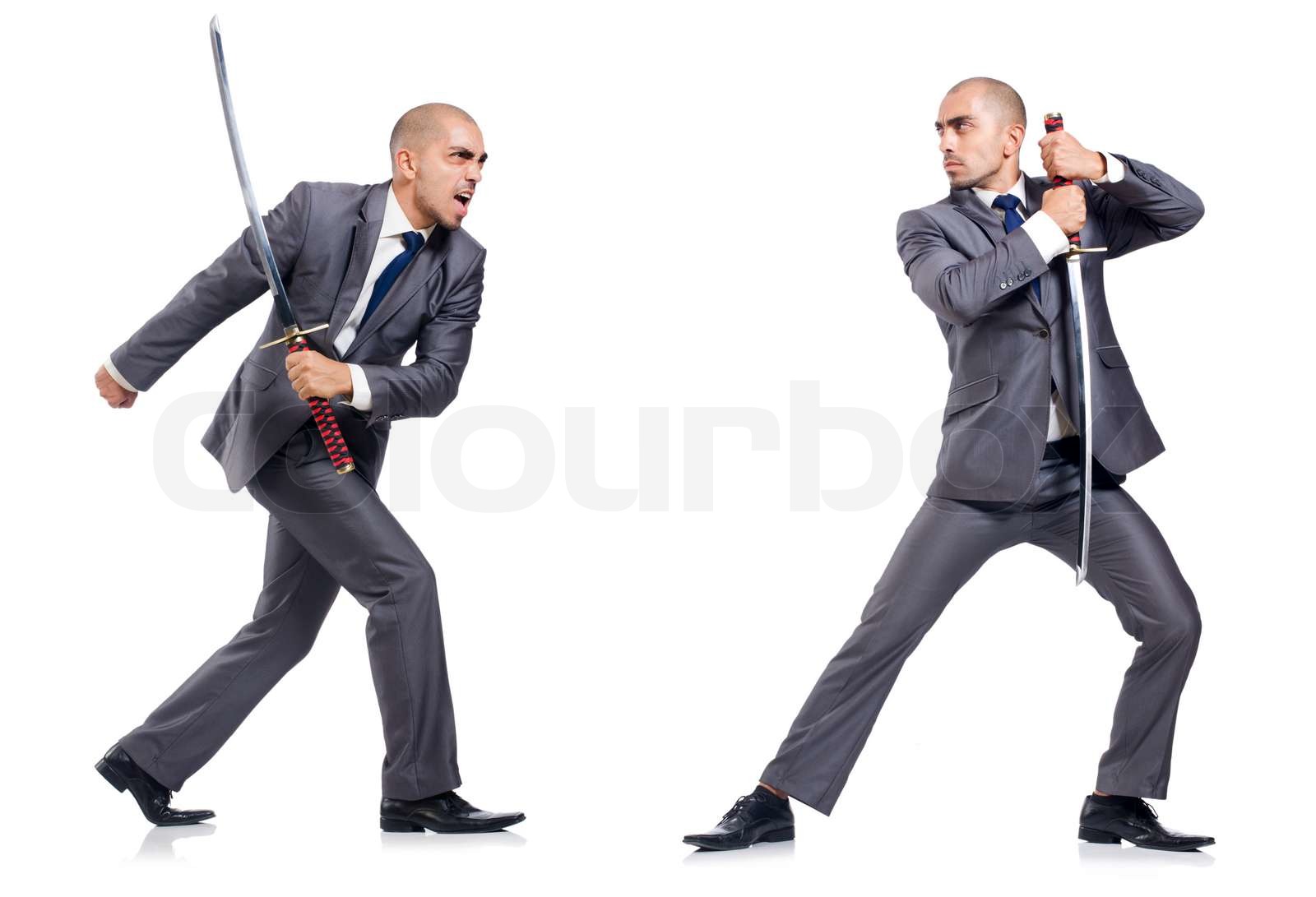 Two men figthing with the sword isolated on white | Stock image | Colourbox