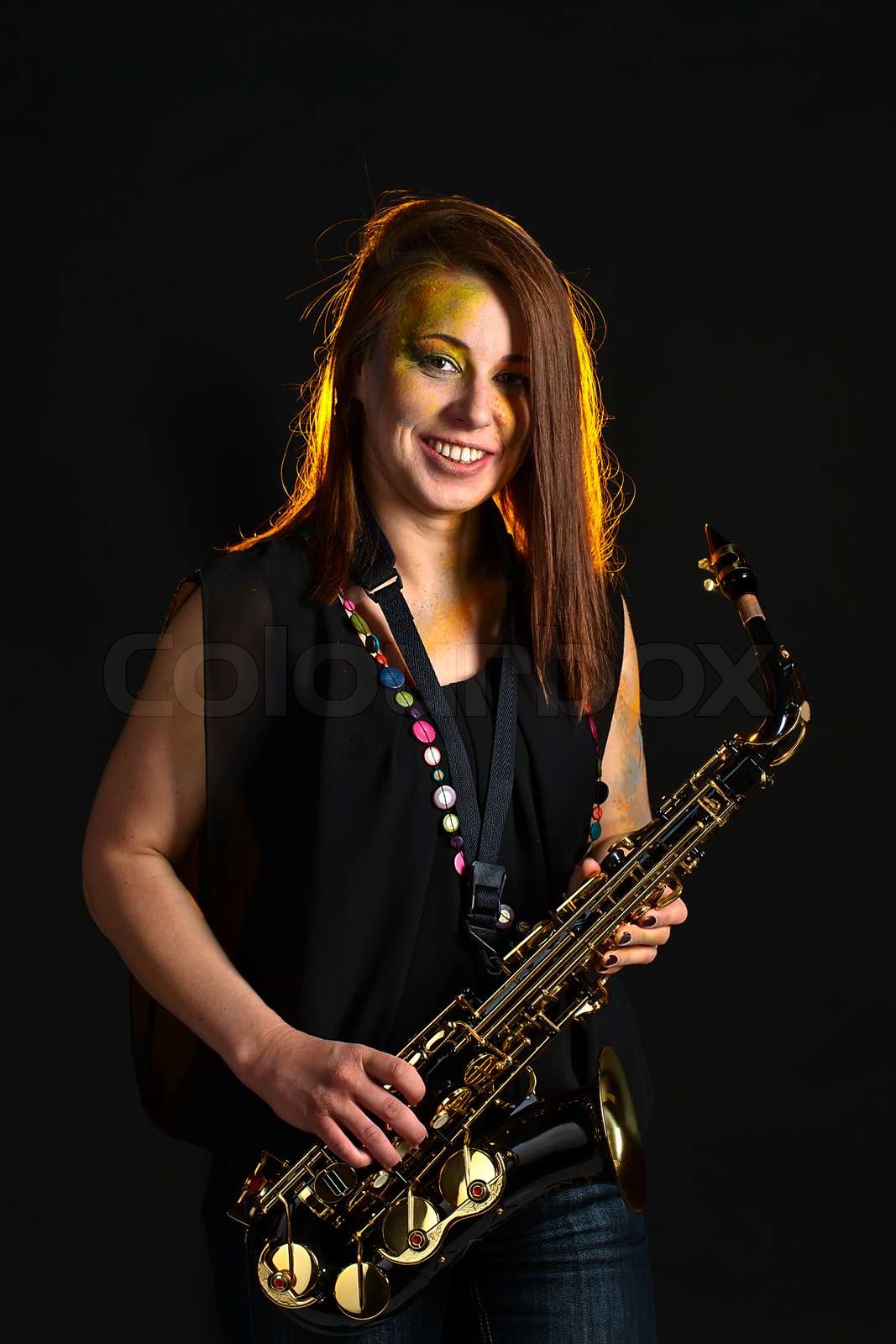woman with saxophone | Stock image | Colourbox