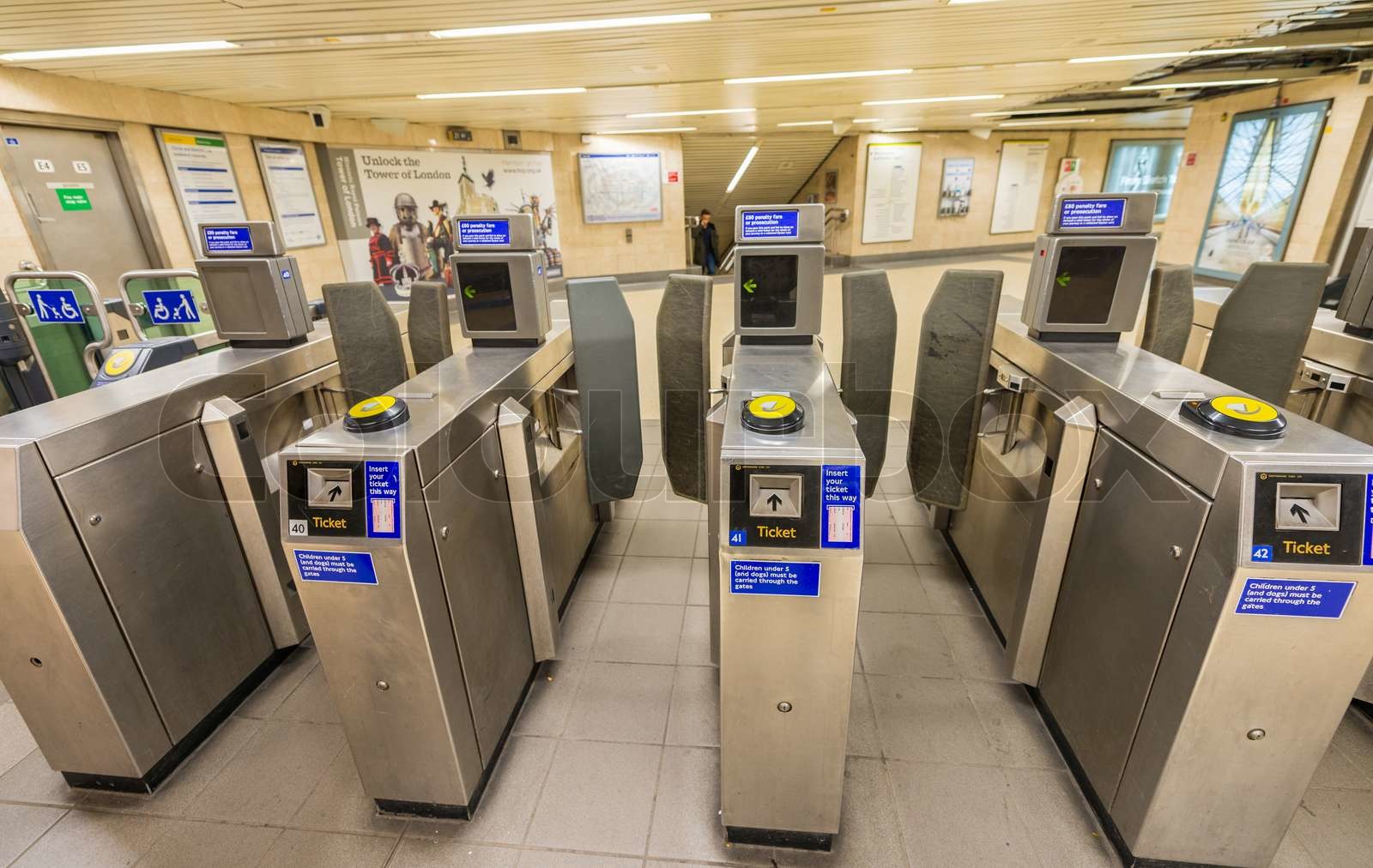 LONDON - AUG 21, 2013: Underground station entrance gates. Underground ...