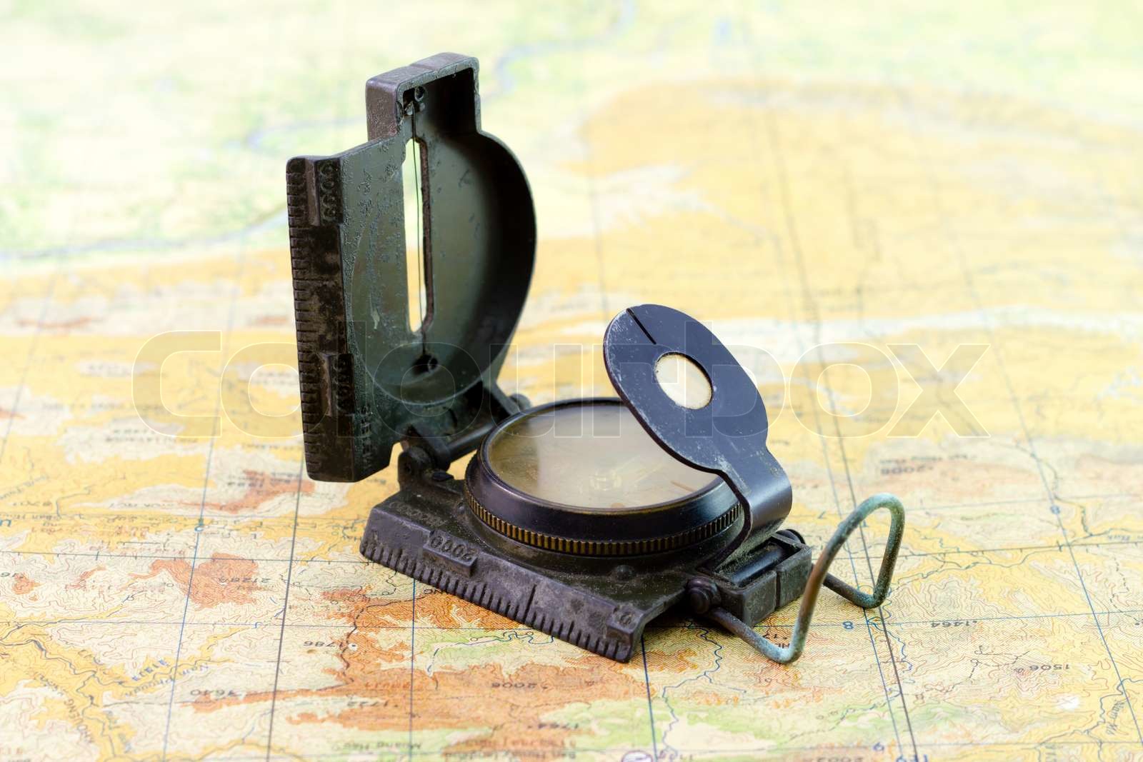 military compass on the map | Stock image | Colourbox