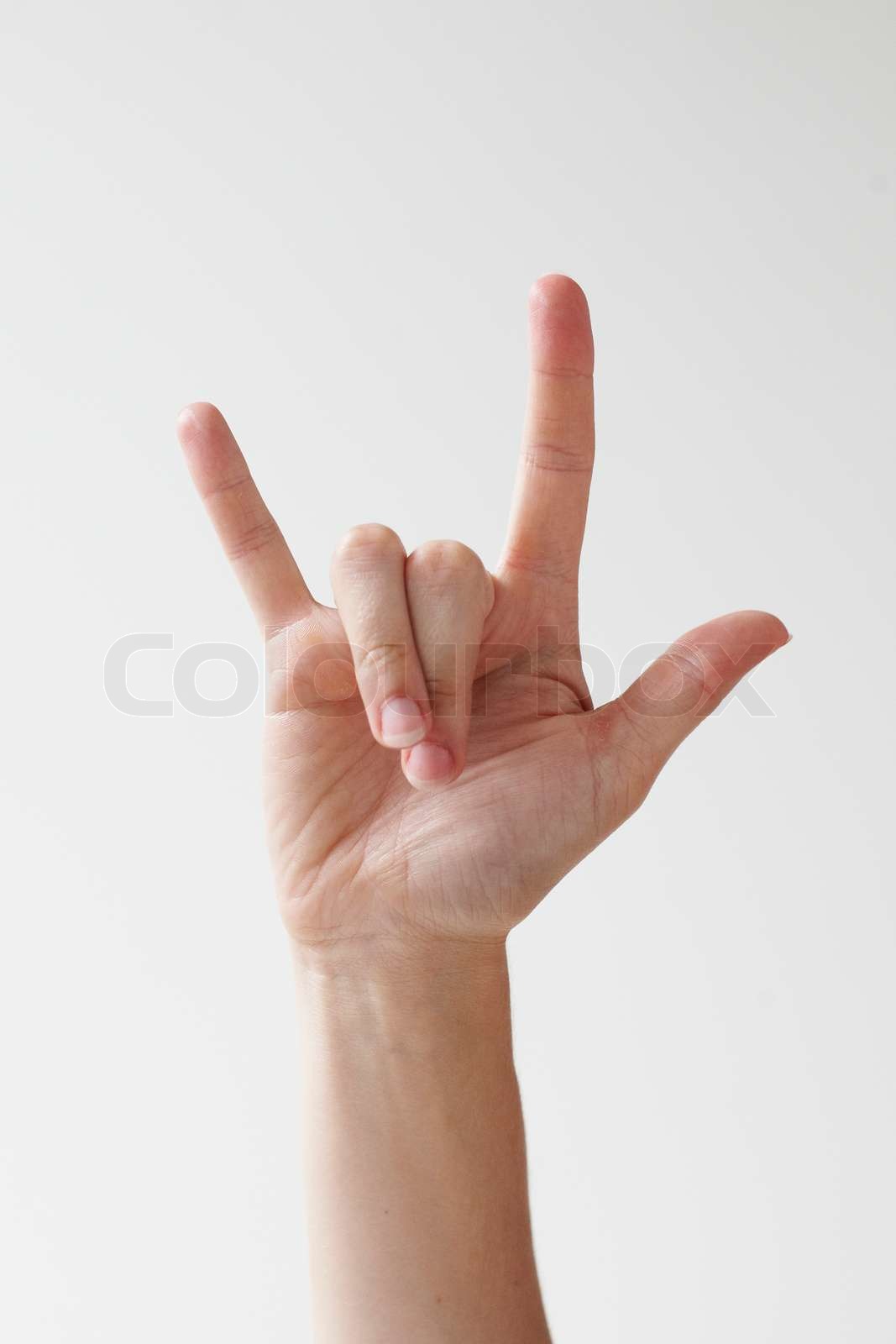 Hand gesturing sign language - rock n' roll | Stock image | Colourbox